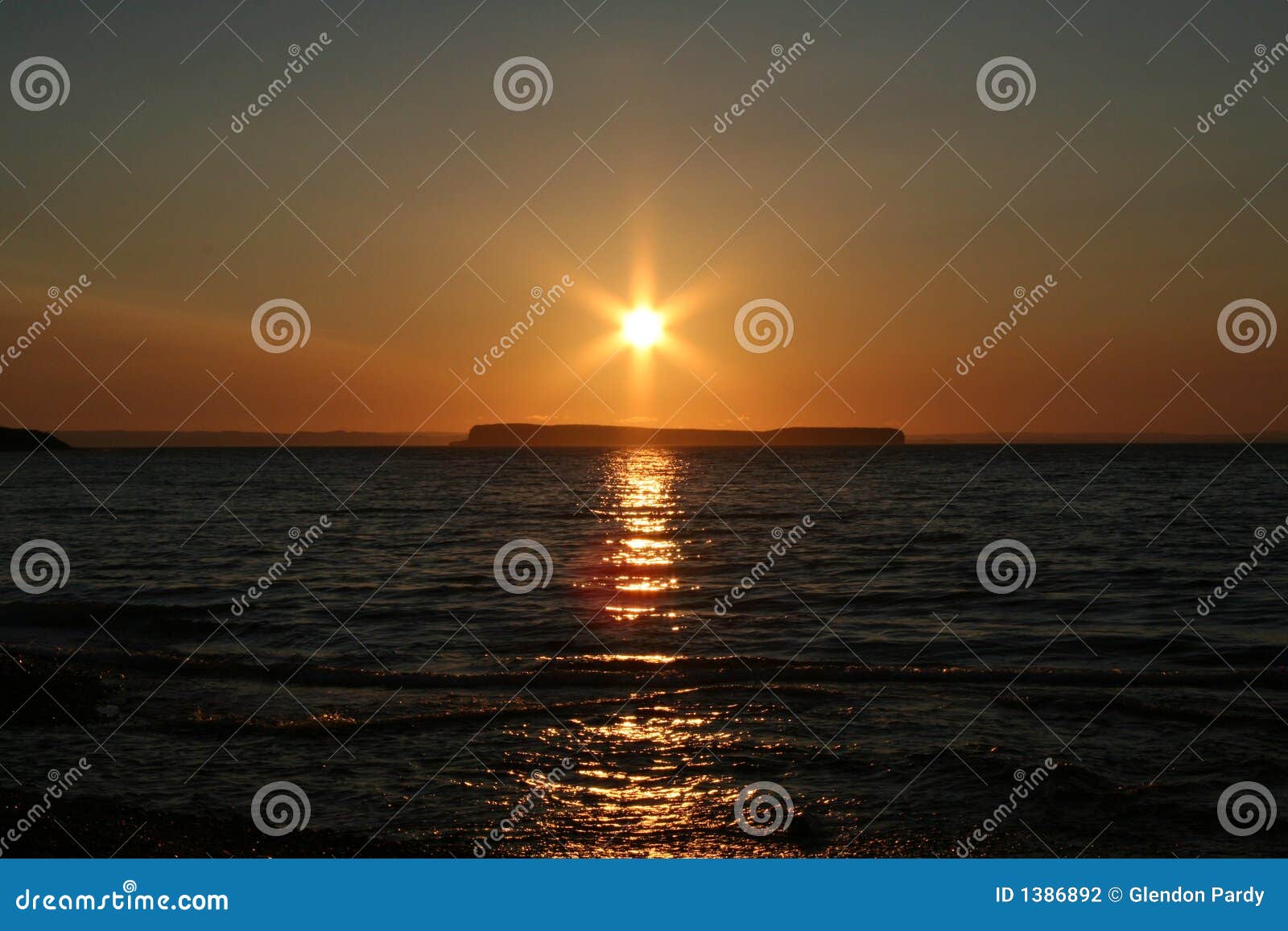 Blazing Sunset stock photo. Image of evening, sunset, island - 1386892