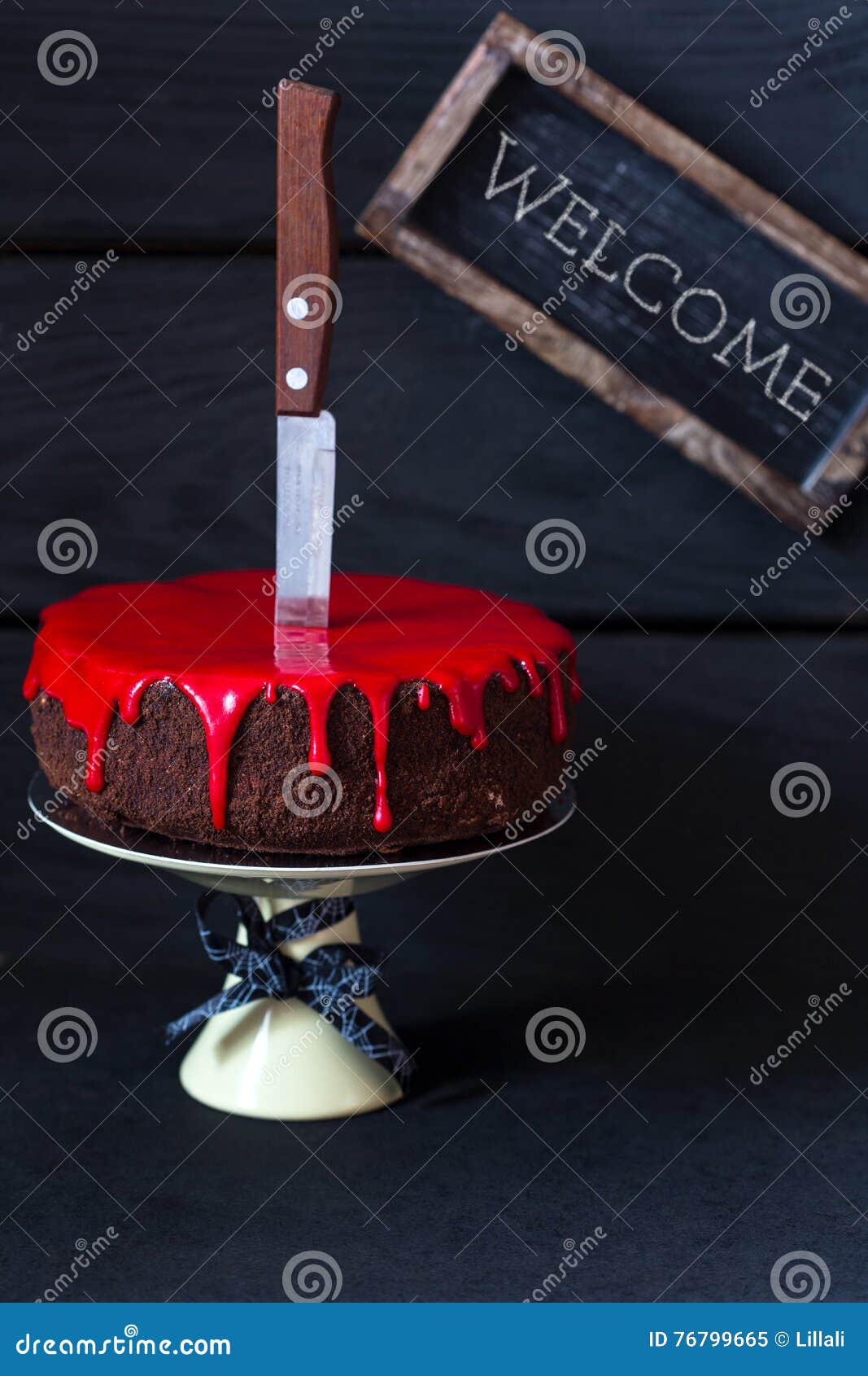 Bleeding Monster Cake With A Knife On Dark Background Stock Photo ...