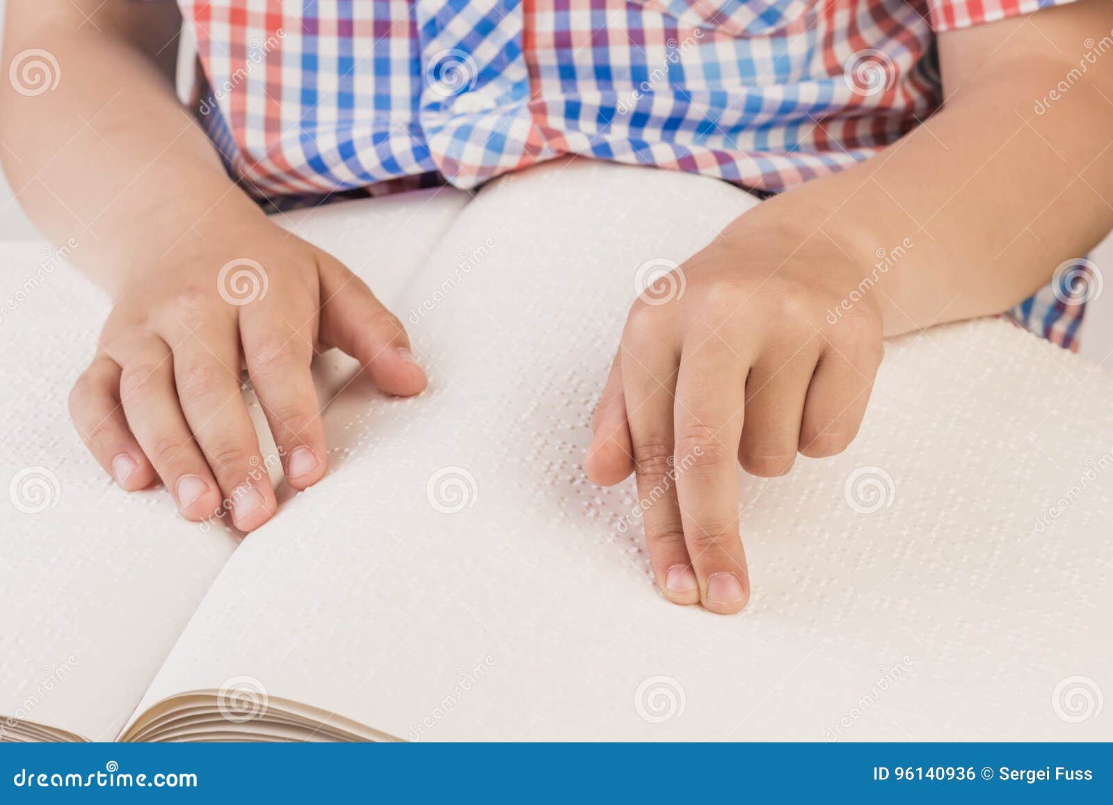 The Blind Boy is Reading a Book Written on Braille. Stock Photo - Image ...