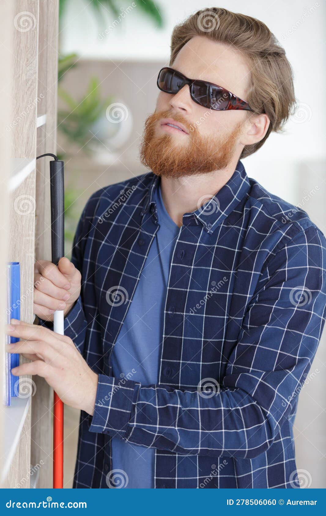 Blind man looking for book stock photo. Image of language - 278506060