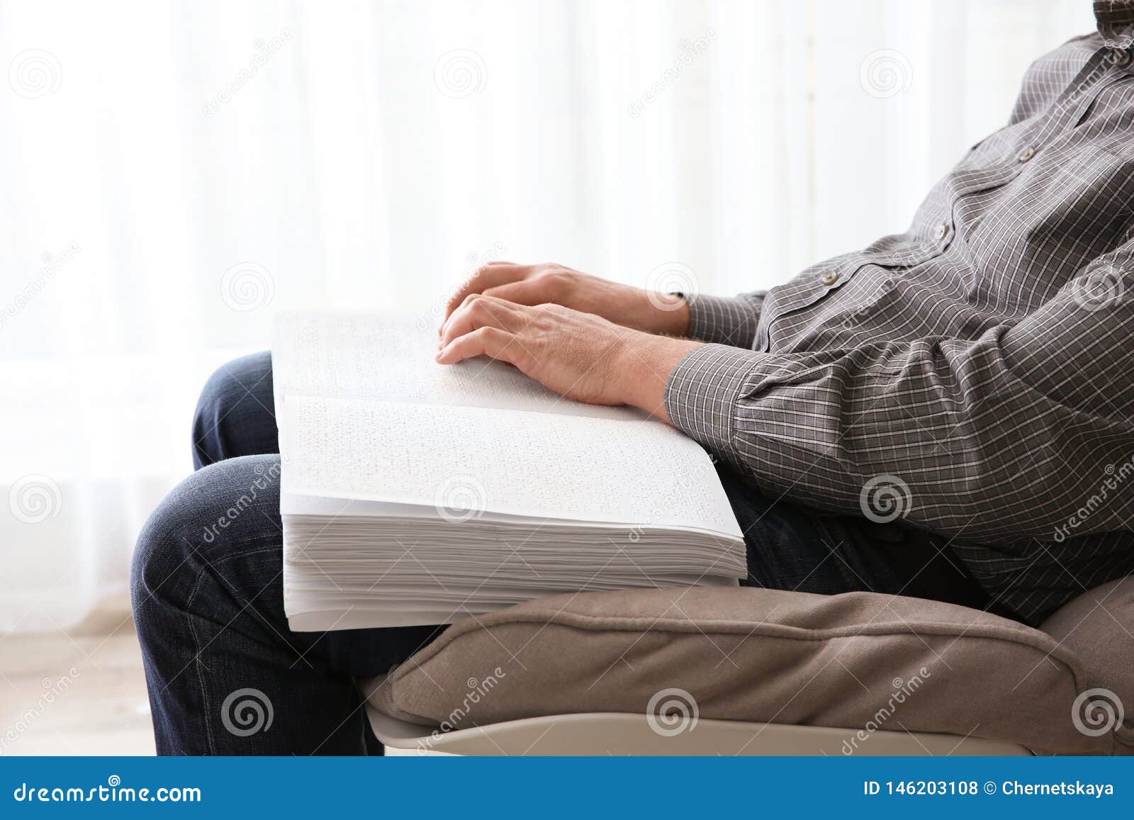 Blind Man Reading Book Written in Braille at Home Stock Photo - Image ...