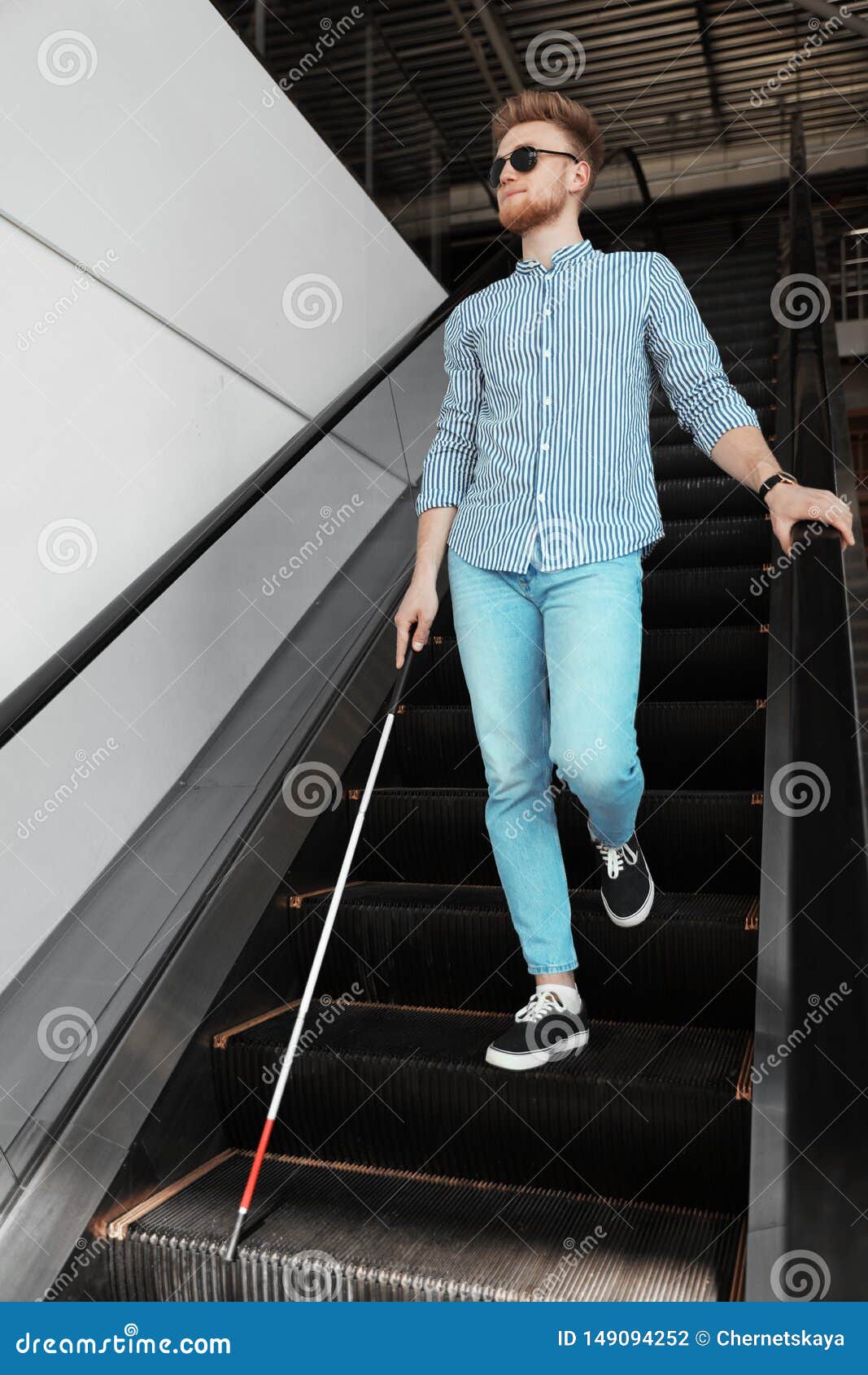 Blind Person with Long Cane on Escalator Stock Photo - Image of full ...