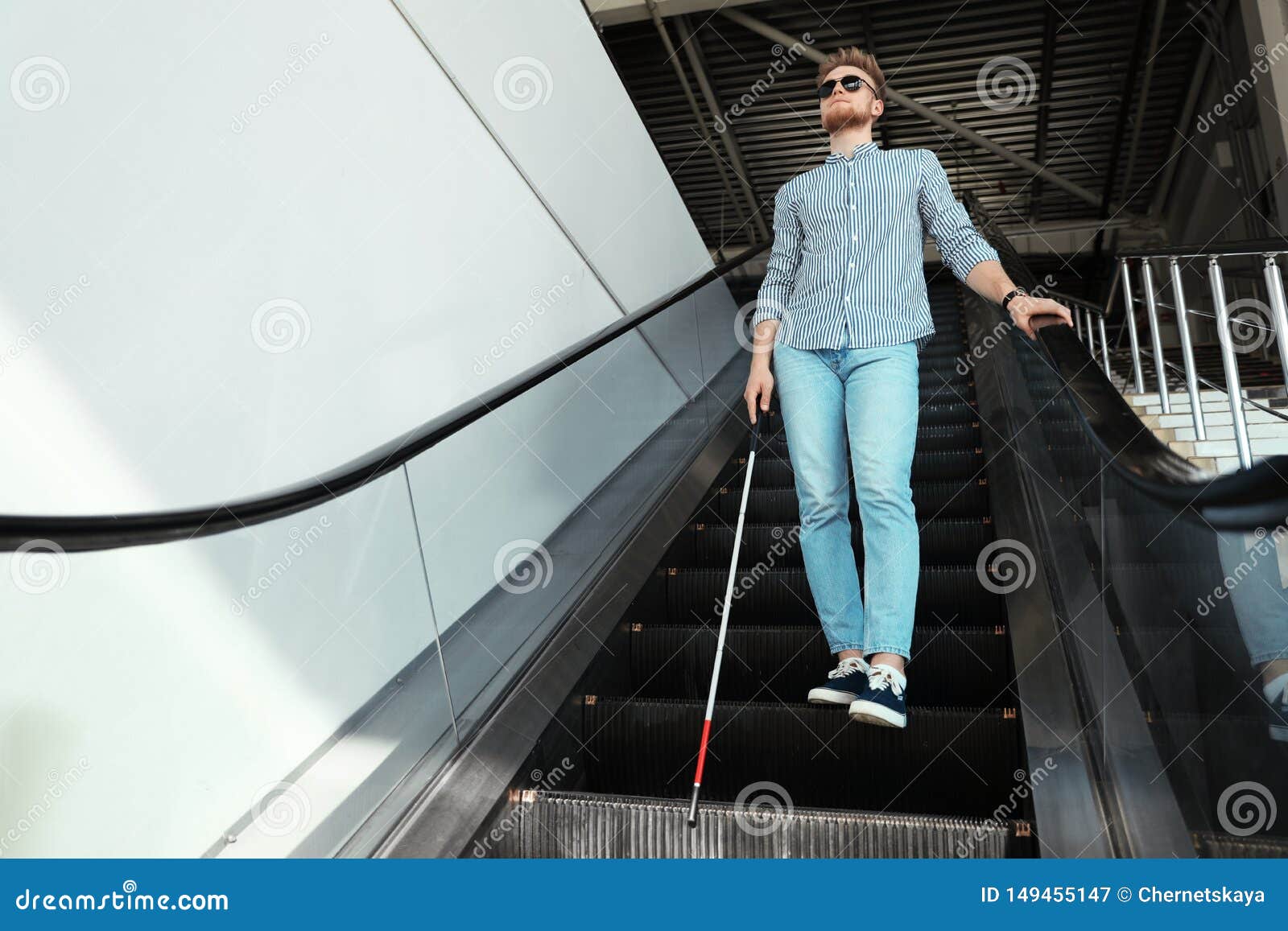 Blind Person with Long Cane on Escalator Indoors Stock Image - Image of ...