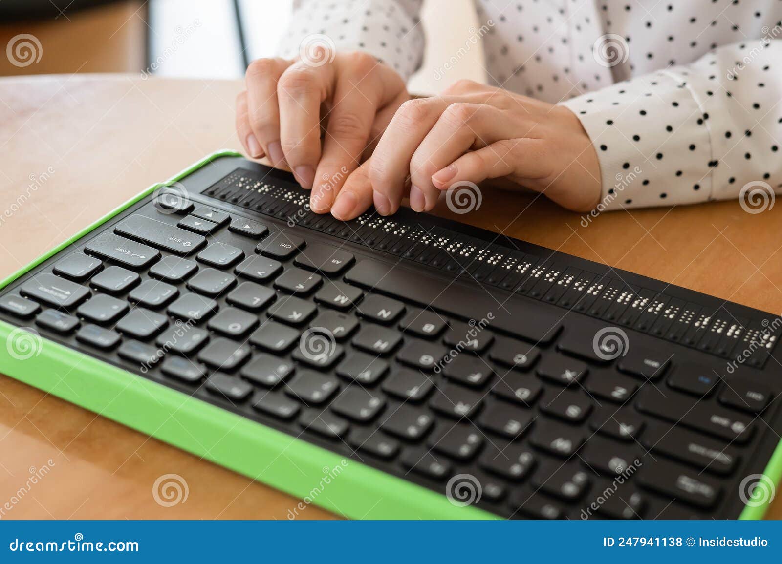 A Blind Woman Uses a Computer with a Braille Display and a Computer ...
