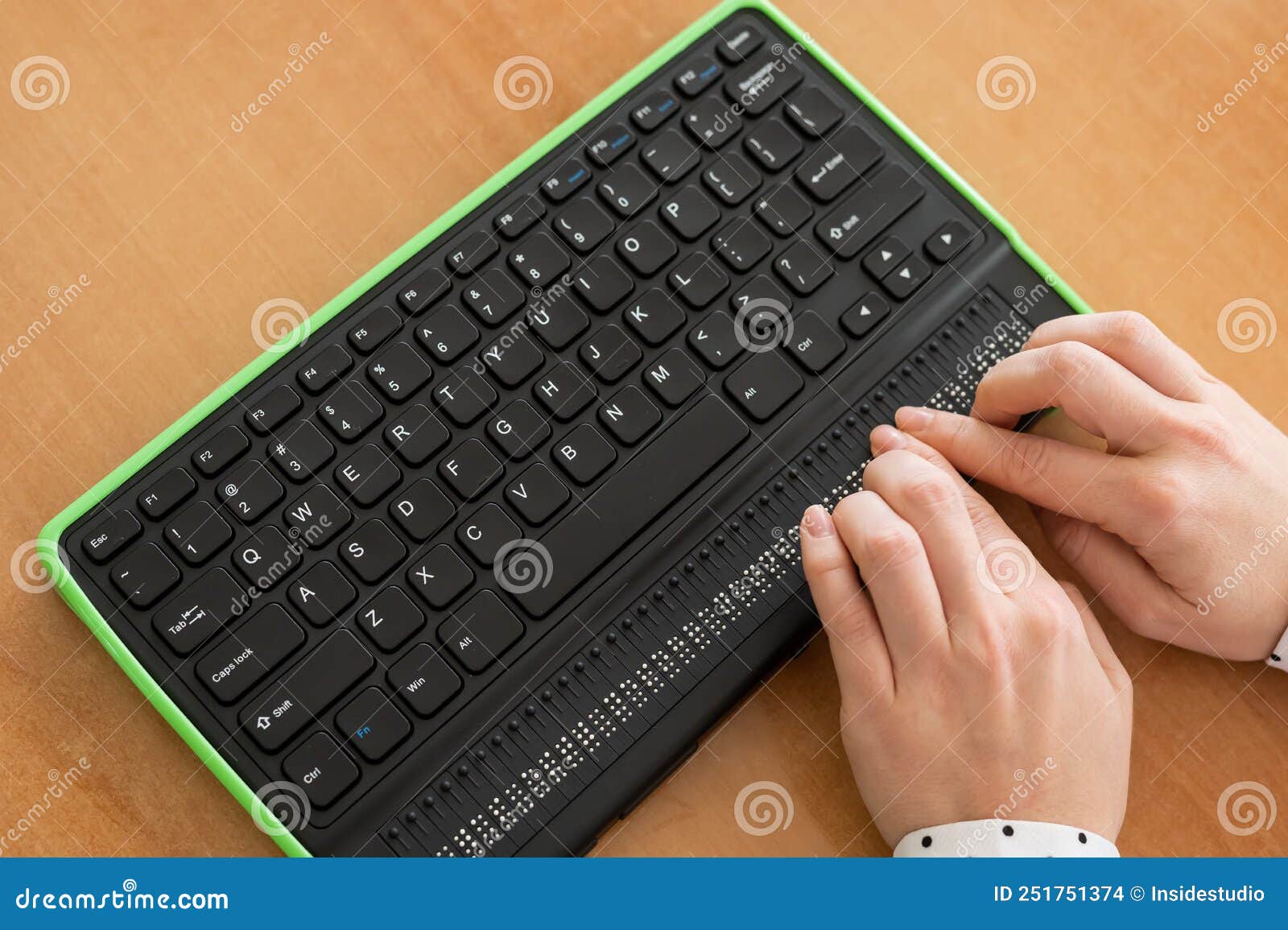 A Blind Man Uses A Computer With A Braille Display And A Computer ...