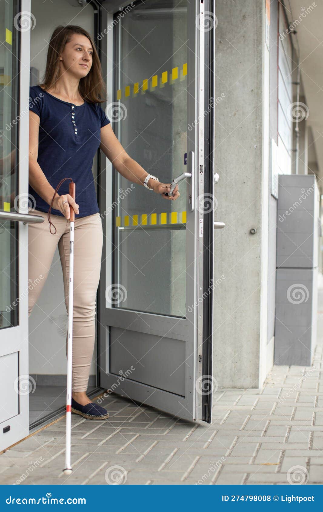 Young Woman with Vision Impairment Walking on City Streets Stock Photo ...