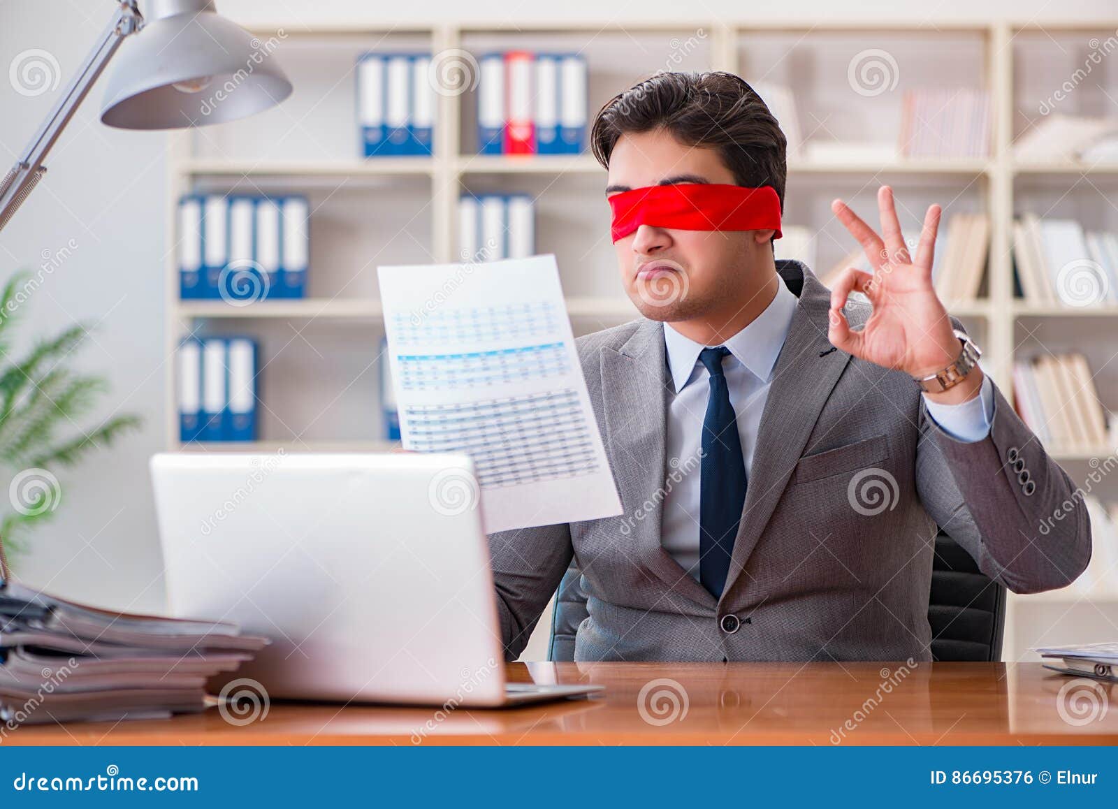 The Blindfold Businessman Sitting at Desk in Office Stock Photo - Image ...