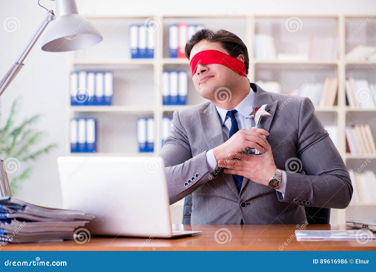 The Blindfold Businessman Sitting at Desk in Office Stock Photo - Image ...