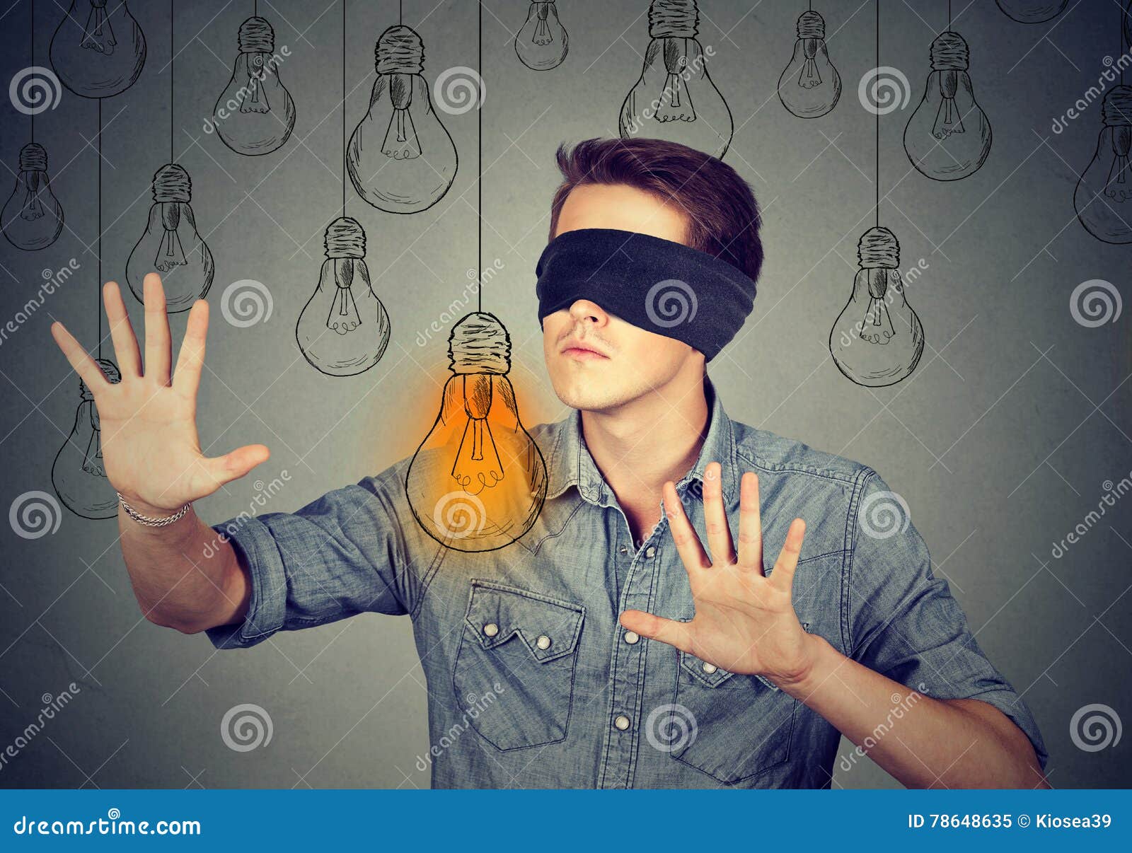 Blindfolded Man Walking through Light Bulbs Searching for Idea Stock ...