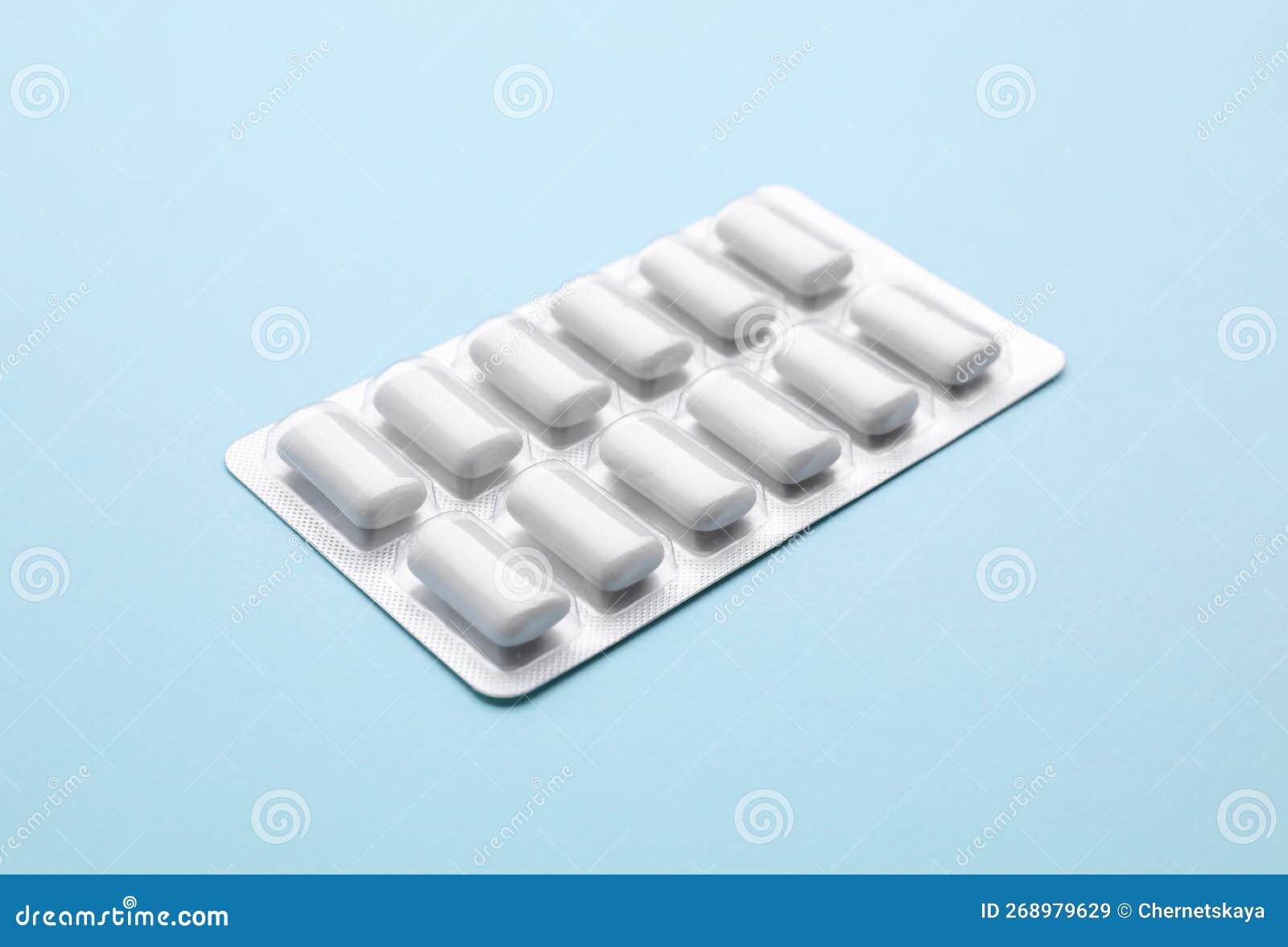 Blister with Chewing Gums on Light Blue Background Stock Image - Image ...