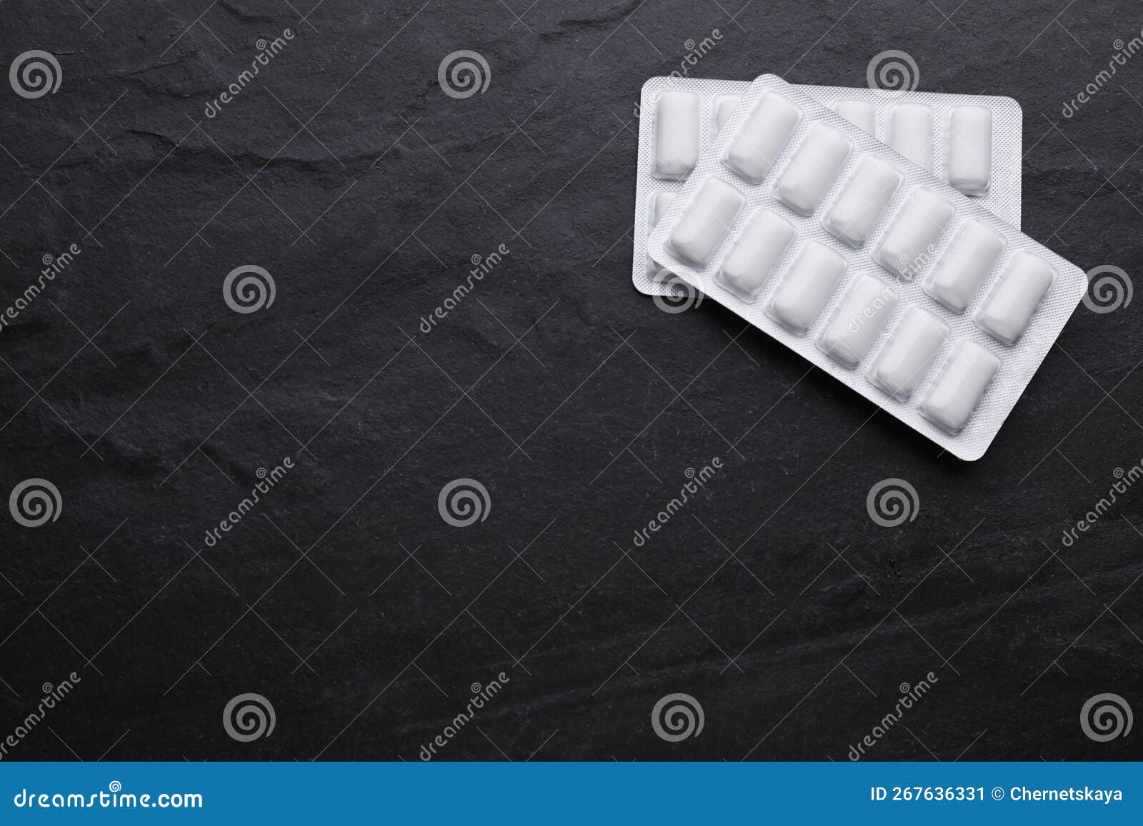Blisters with Chewing Gums on Black Table, Top View. Space for Text ...