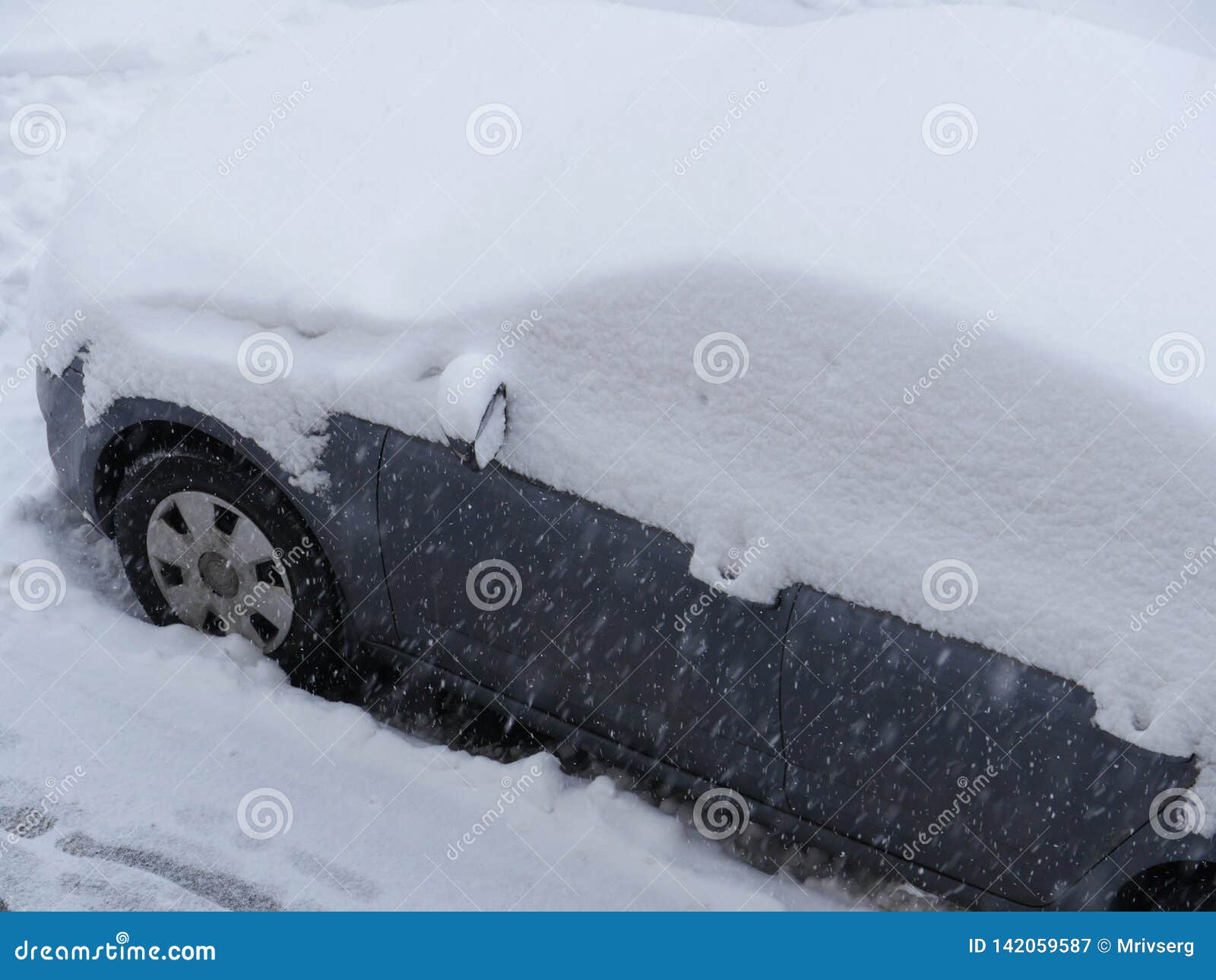 Blizzard car snow-covered stock image. Image of people - 142059587