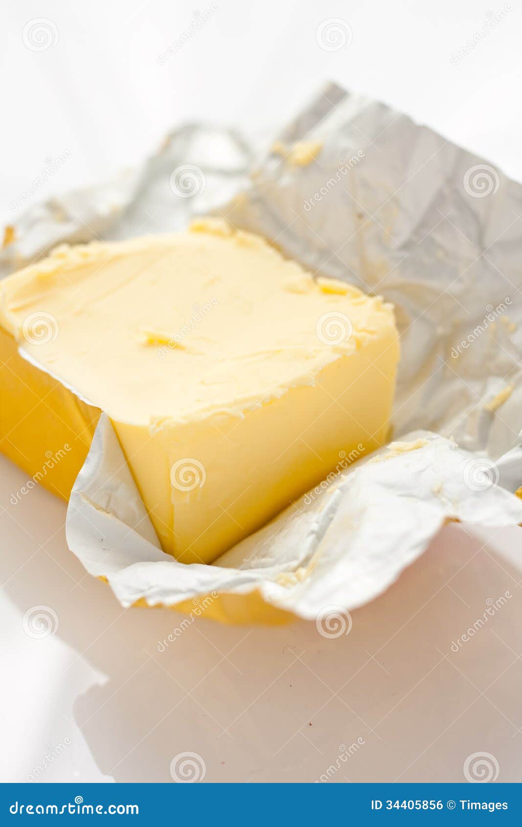 Block of butter stock photo. Image of food, yellow, vertical - 34405856
