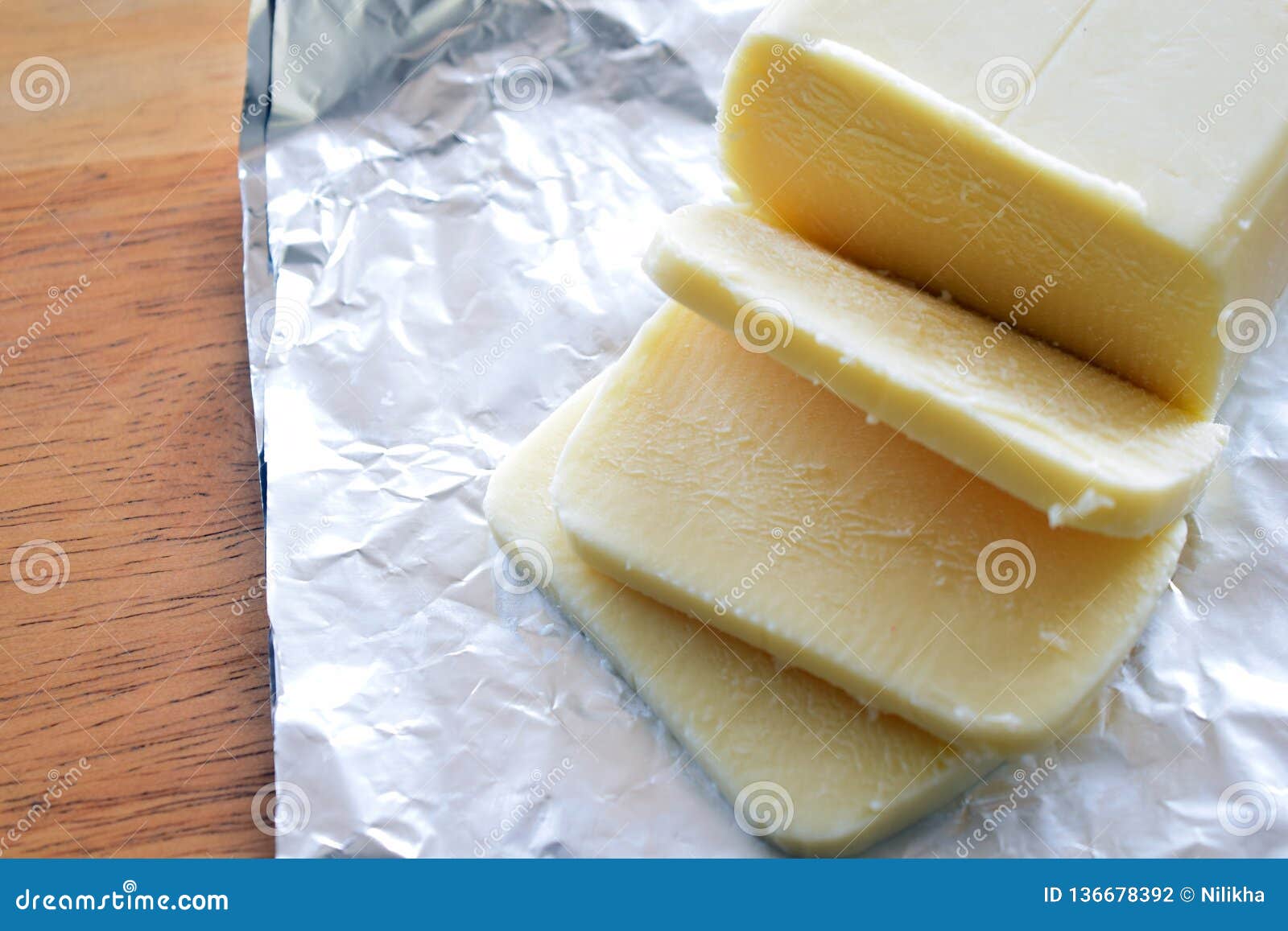 Block of Cheese stock photo. Image of product, cheese - 136678392