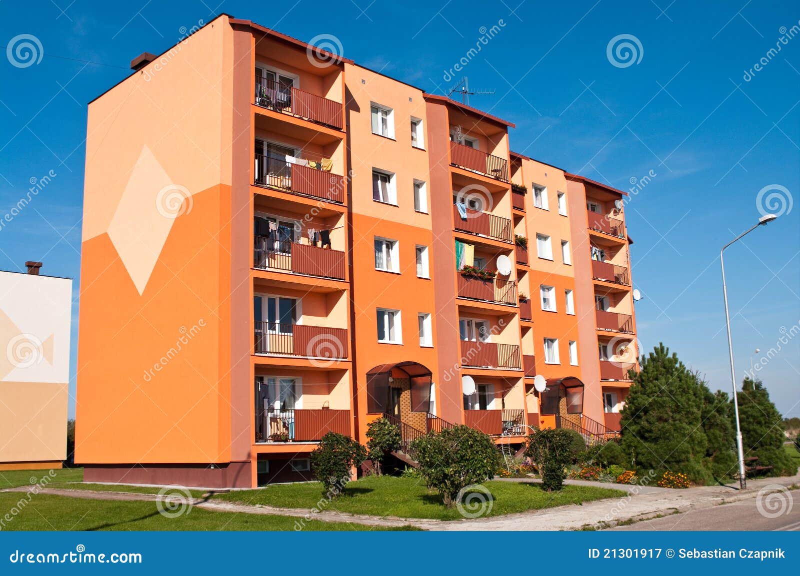 Block of flats stock image. Image of street, colourful - 21301917