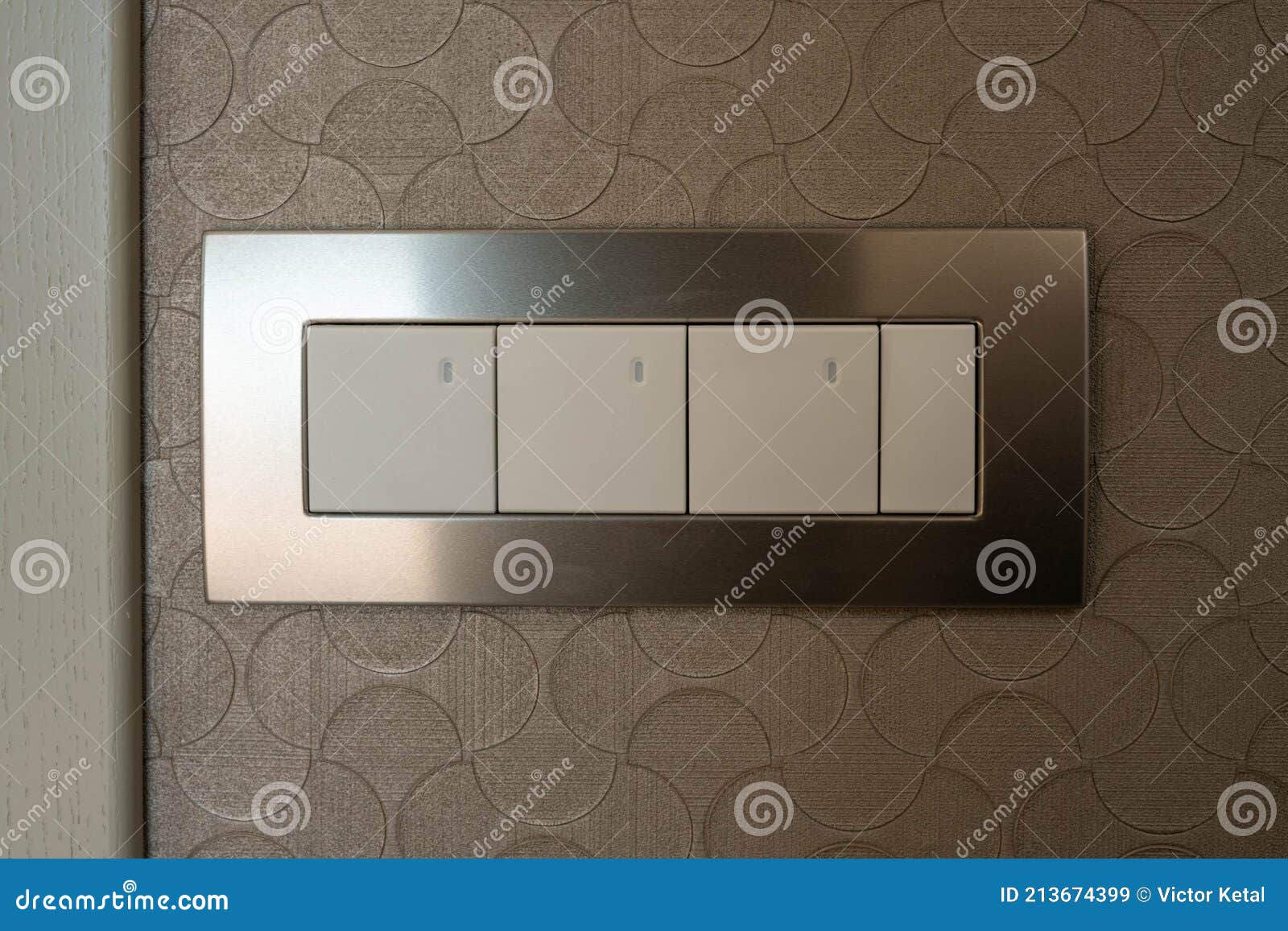 A Block of Four Switches in a Metal Frame. Illumination on the Switch ...