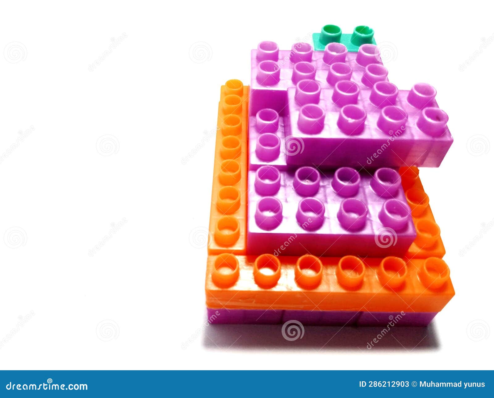 Block Stacking Toy on a White Background Stock Image - Image of yellow ...