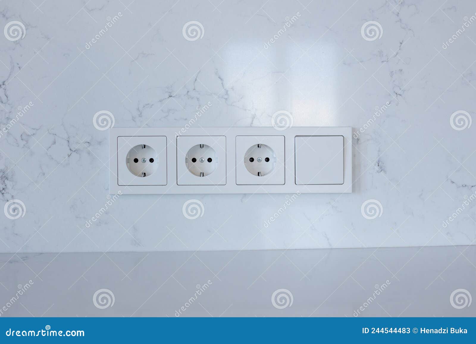 Block of Three Sockets and a Switch on a White Wall Stock Image - Image ...