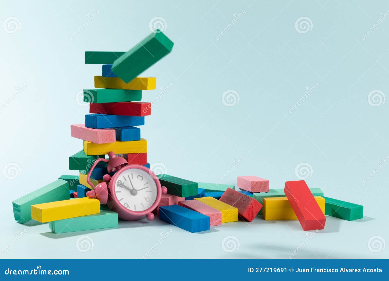 Block Tower Made of Colourfull Wooden Blocks on Light Blue Background ...