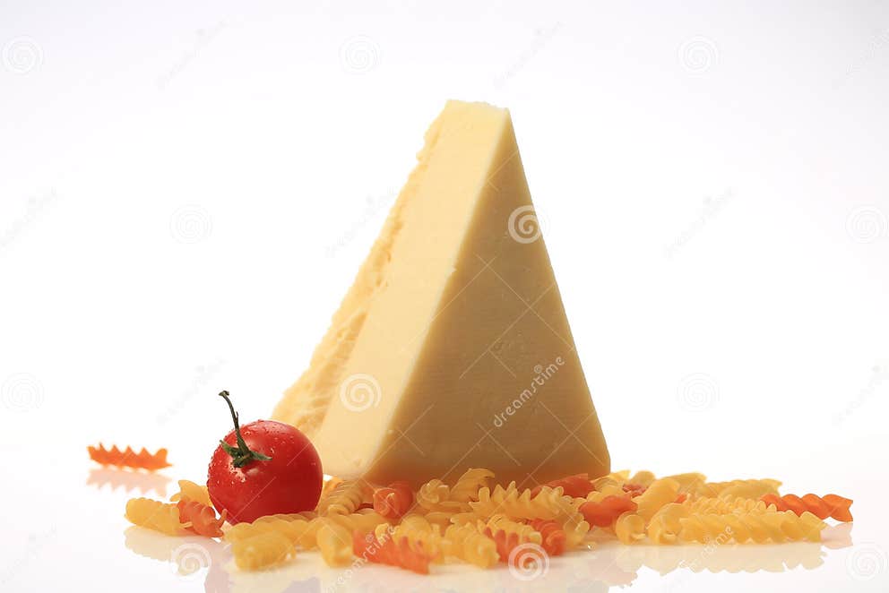 Block and Triangle Sliced Cheese with a Slice of Tomato Stock Image ...