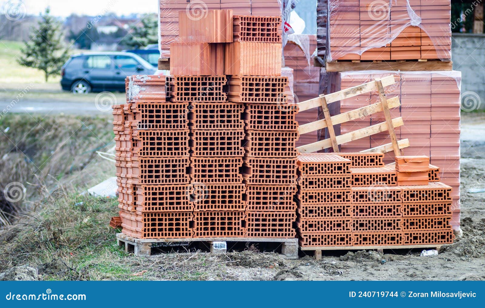 A Pile of Blocks in Front of the Construction Site Stock Photo - Image ...