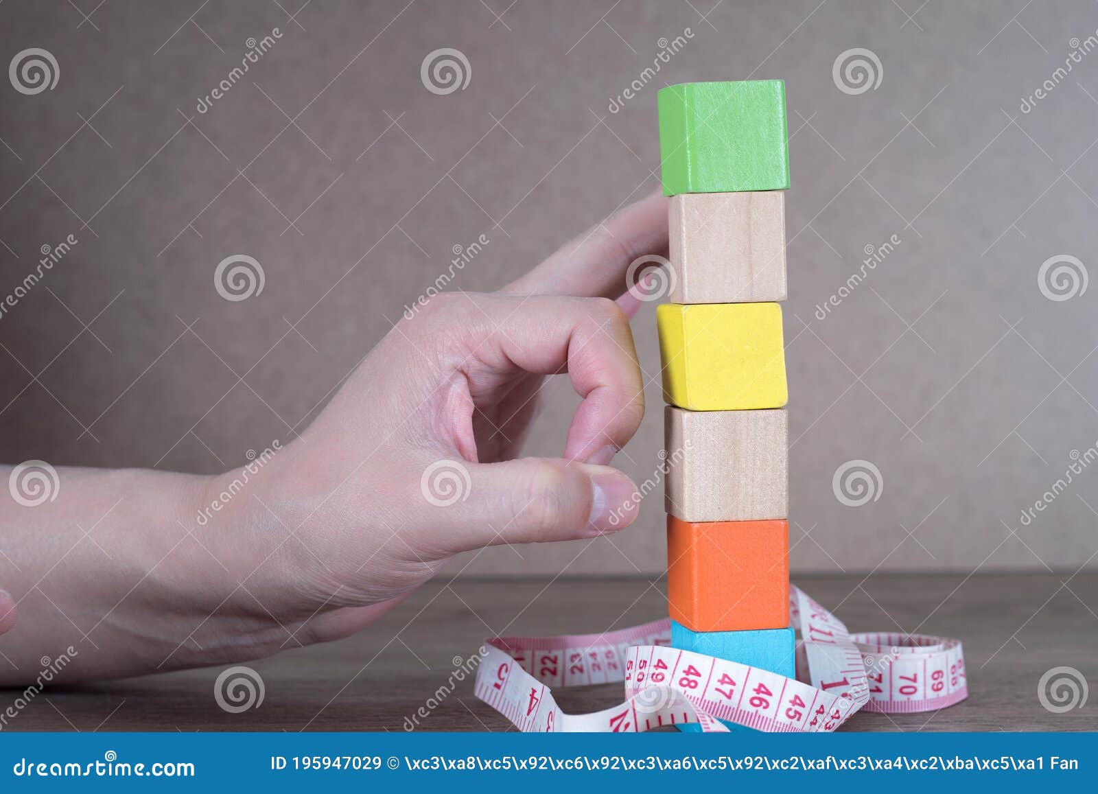 Blocks Stacked Up by Flicking by Hand Stock Image - Image of lowering ...