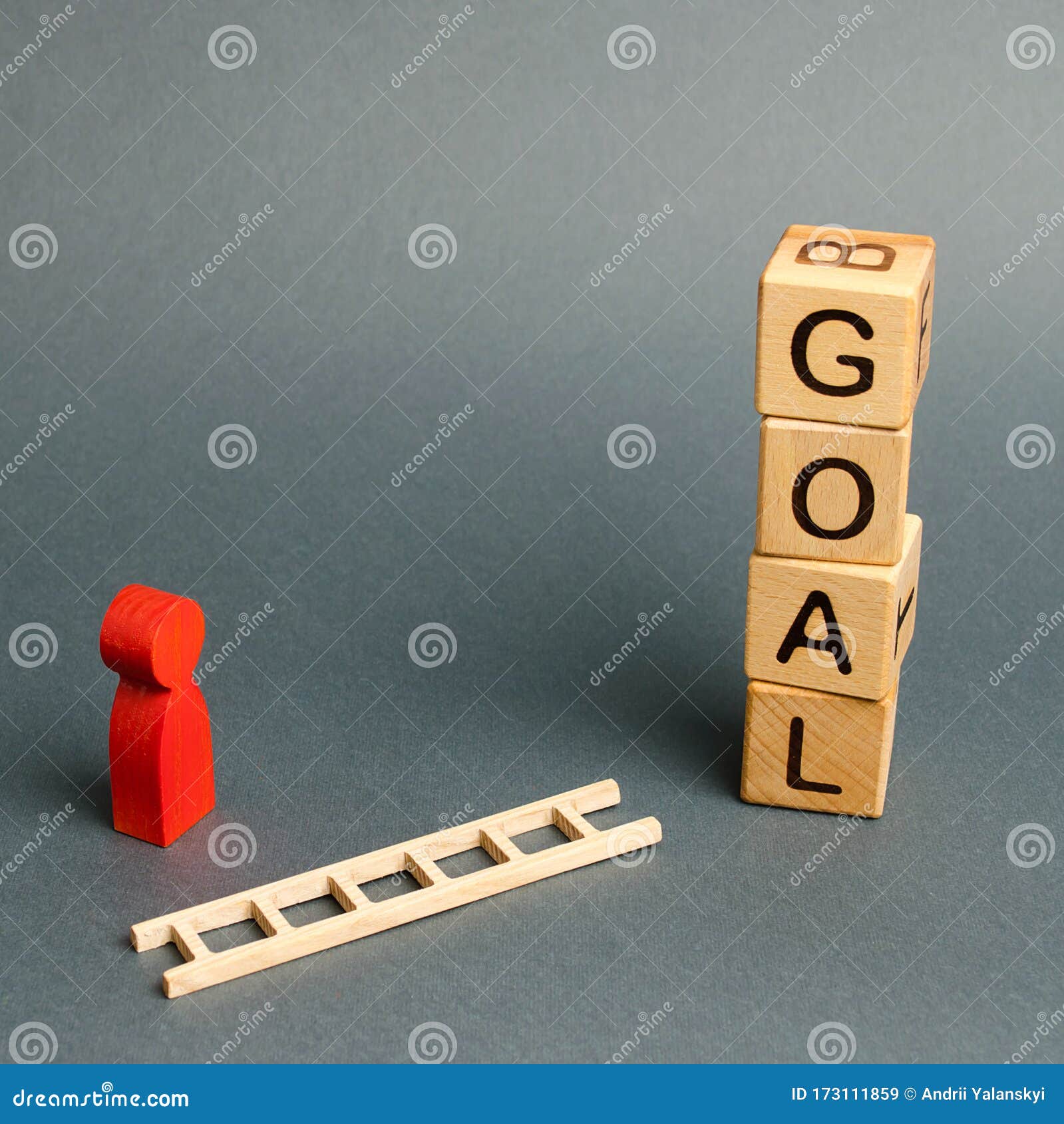 Blocks Tower with Word Goal and a Man Figurine with a Fallen Ladder ...
