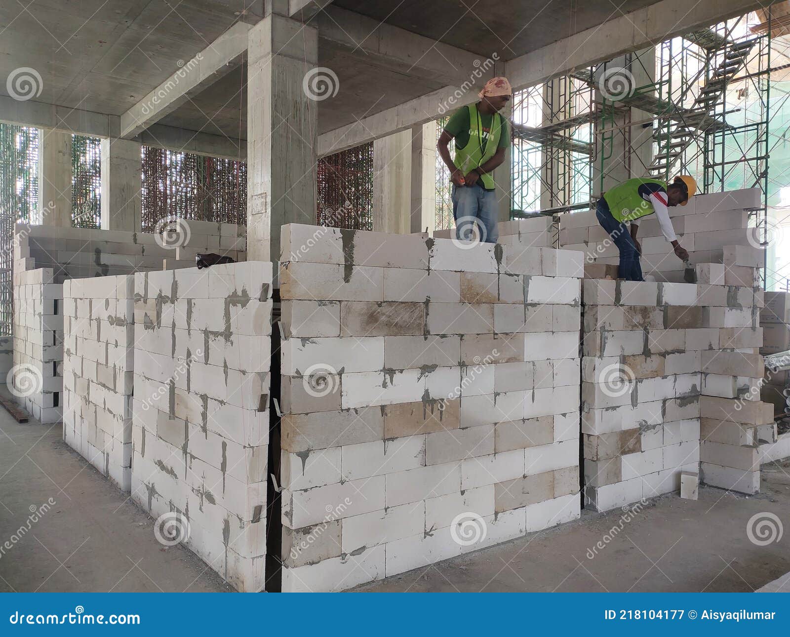 Blockwork by Construction Workers at the Construction Site. Editorial ...