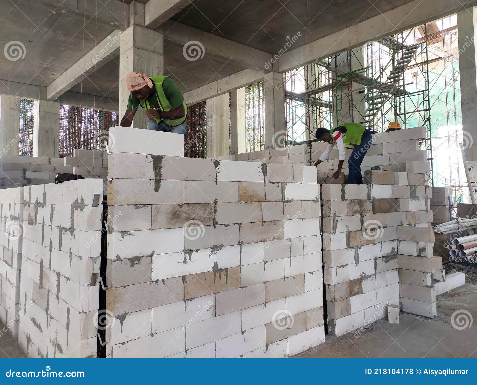 Blockwork by Construction Workers at the Construction Site. Editorial ...