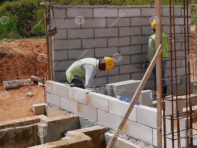 Blockwork by Construction Workers at the Construction Site. Editorial ...