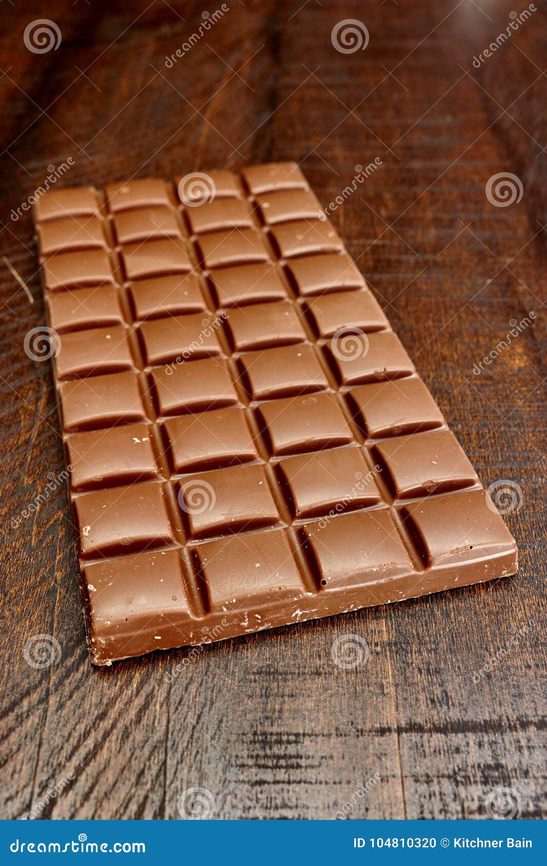 Bloco de chocolate foto de stock. Imagem de caloria - 104810320