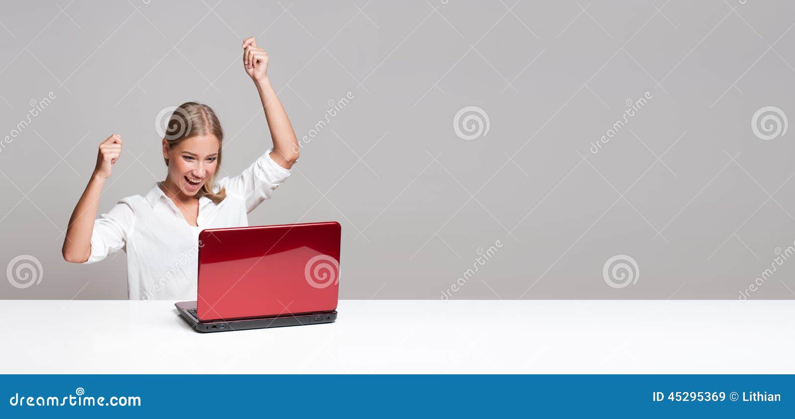 Blond beauty using laptop. stock image. Image of student - 45295369