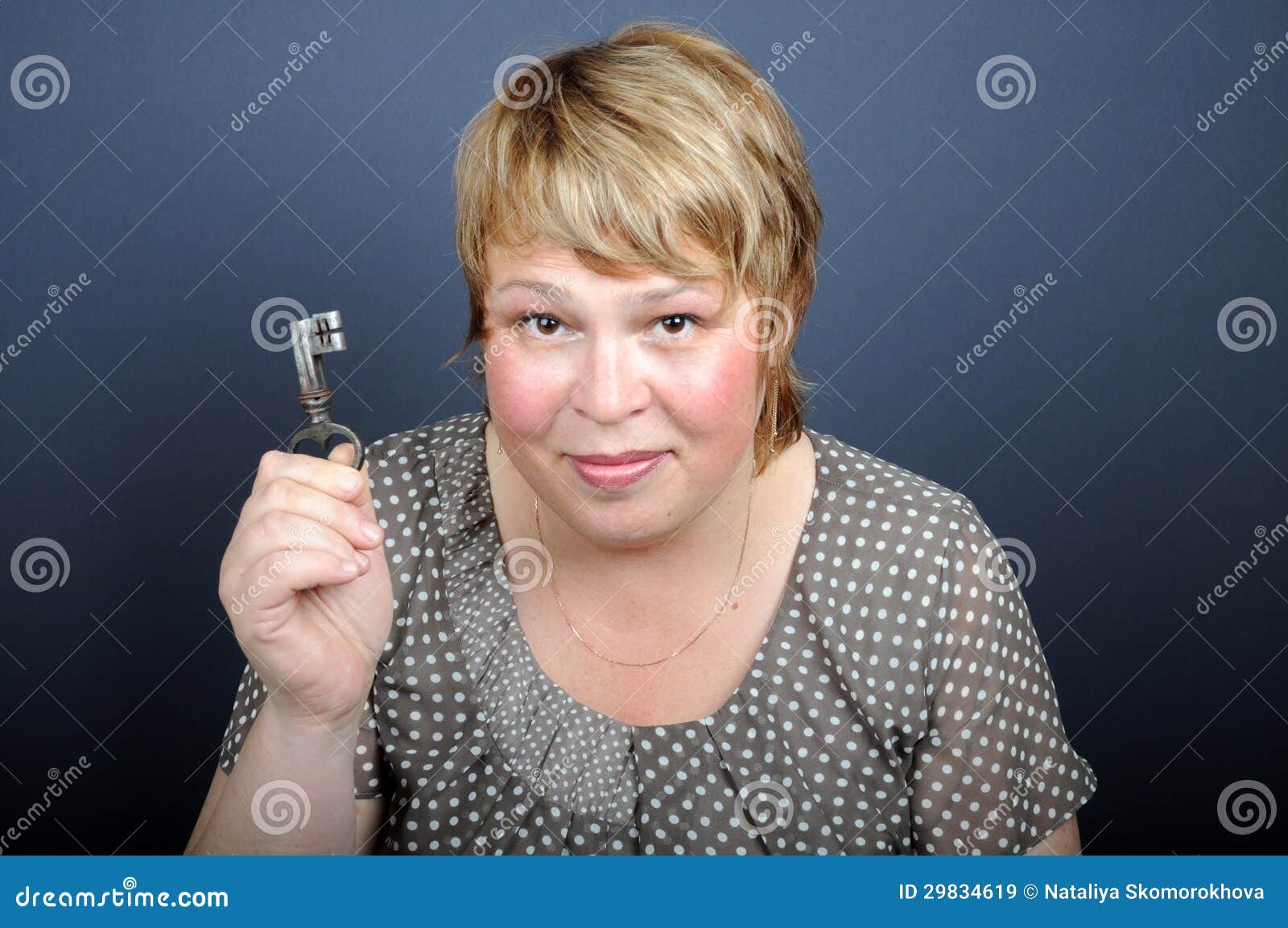 Woman with key stock image. Image of isolated, close - 29834619
