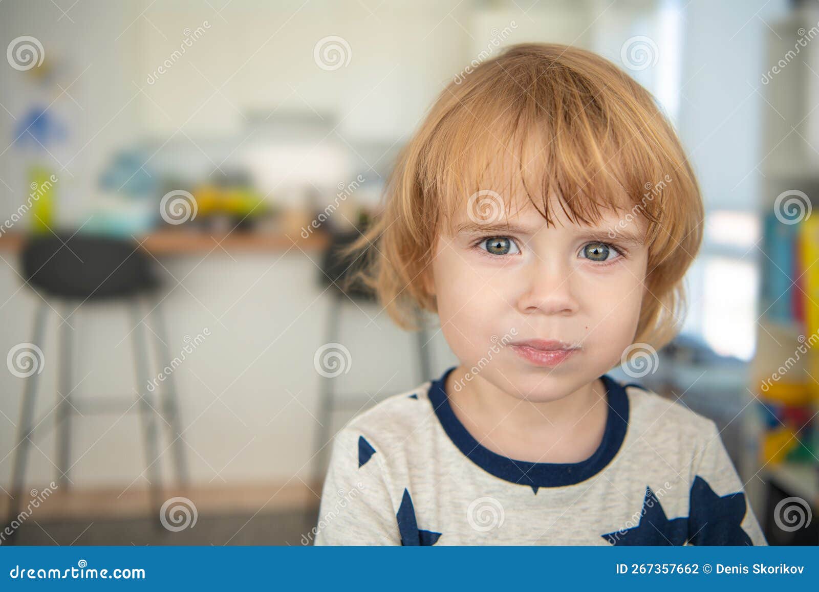 Blond Boy is Eating at the Kitchen Stock Photo - Image of portrait ...