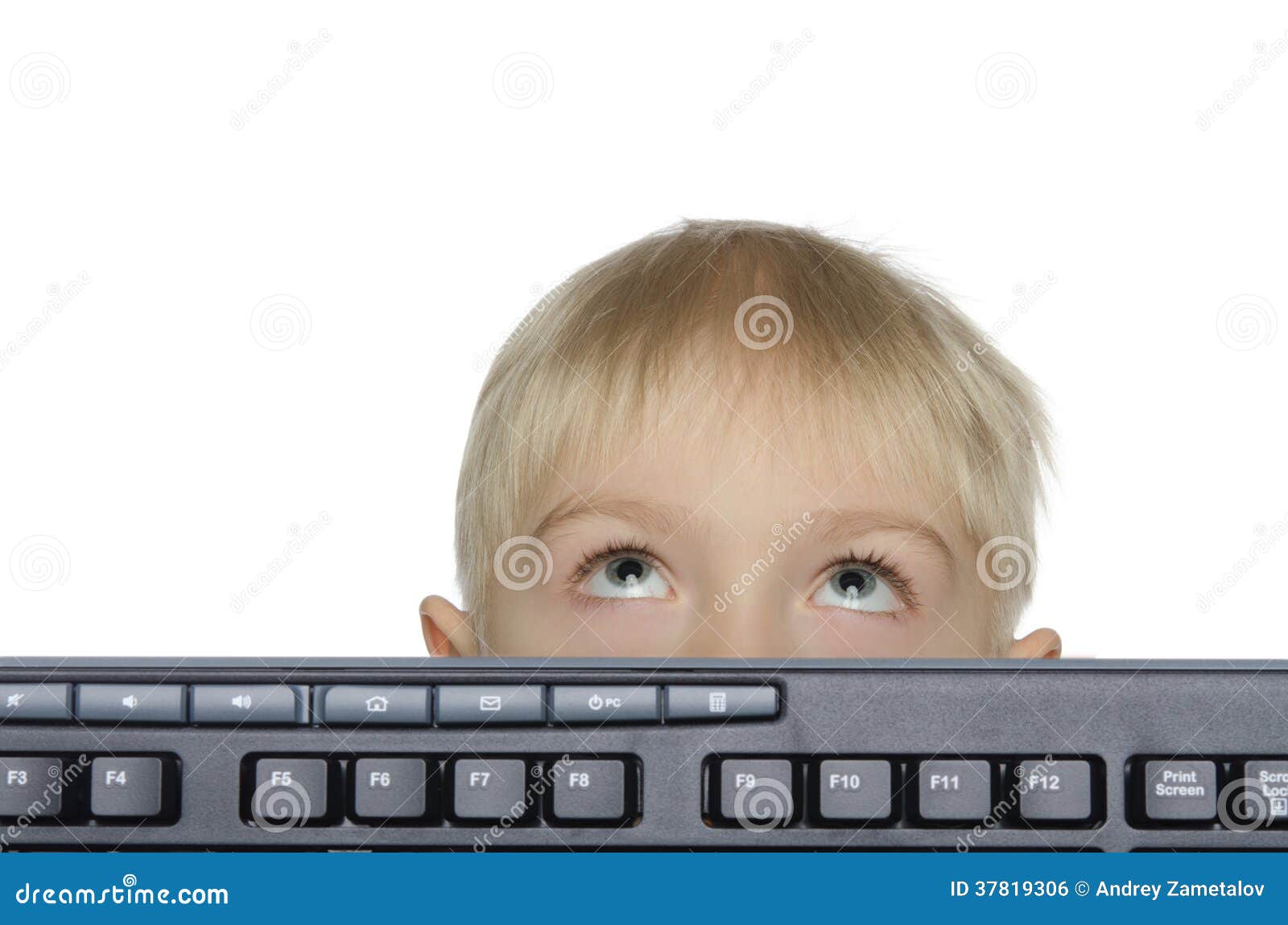 Blond Boy with the Keyboard Looking Up Stock Photo - Image of component ...