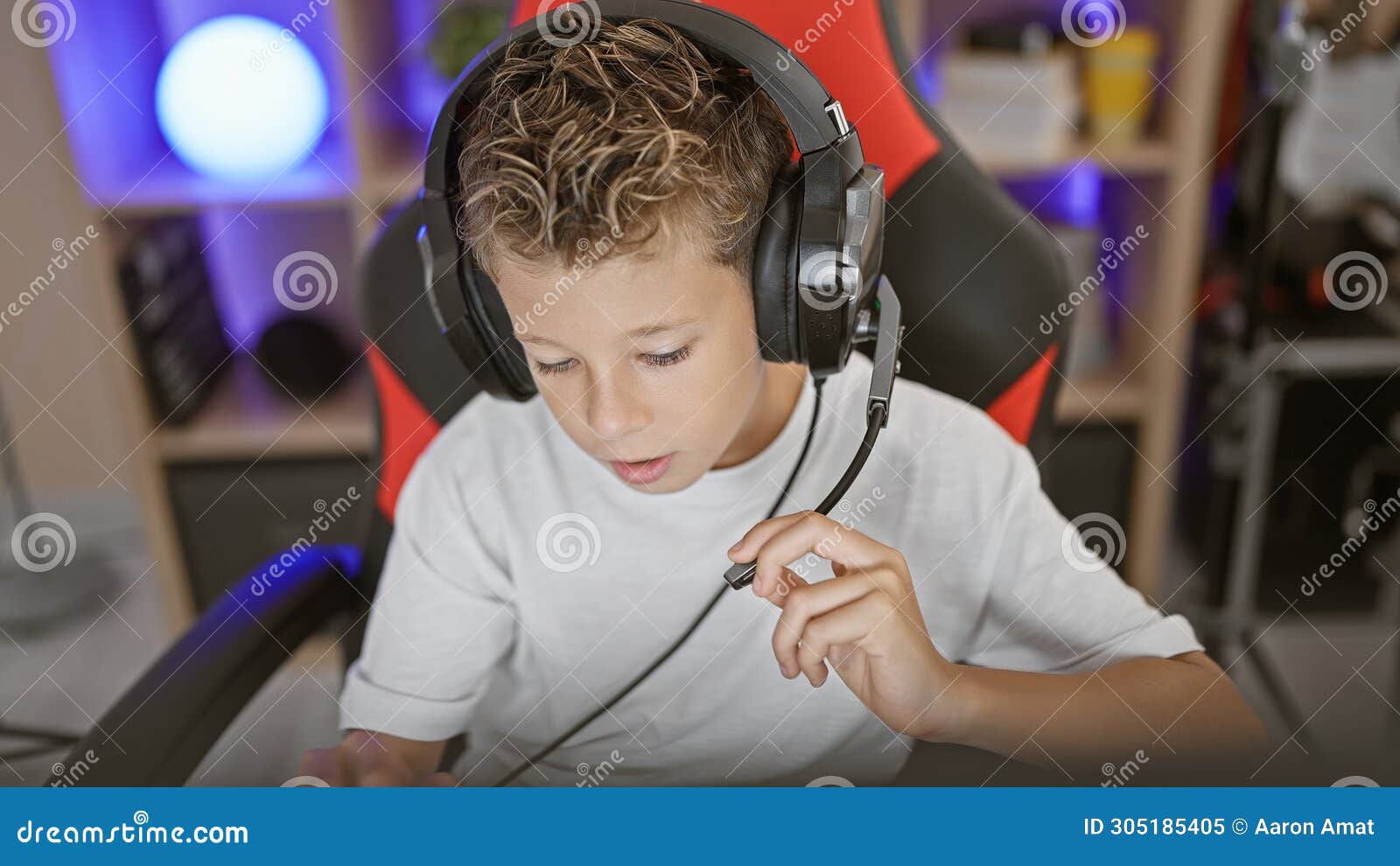 Blond Boy Streamer Playing Video Game Using Computer at Gaming Room ...