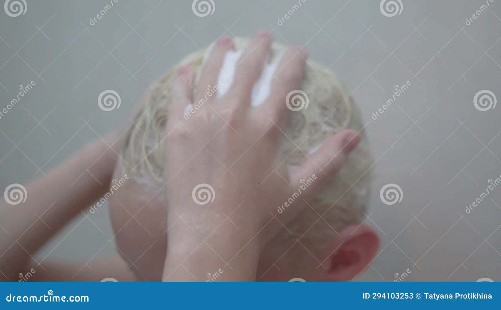 Blond Boy Washes His Hair with Shampoo in the Shower Stock Video ...