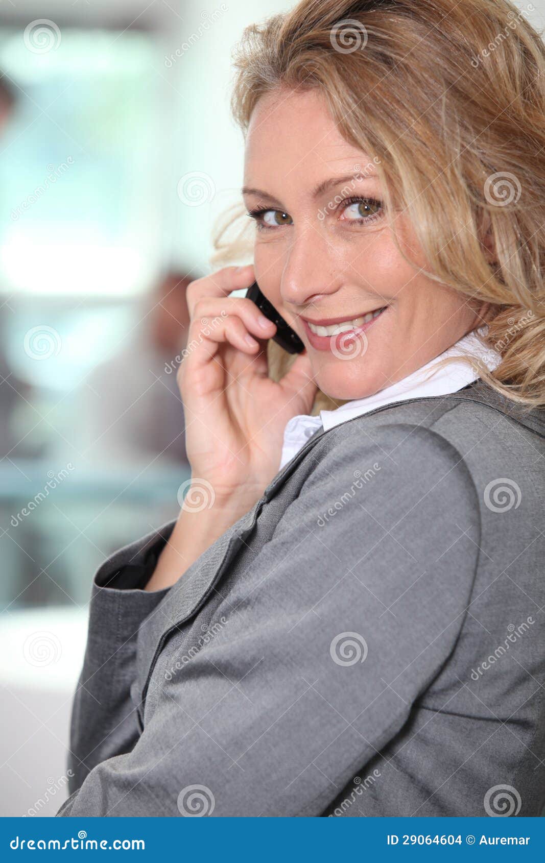 Blond Businesswoman Taking a Call Stock Photo - Image of mobile ...