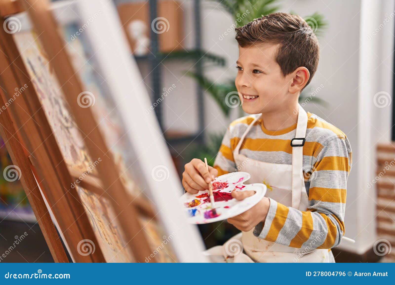 Blond Child Smiling Confident Drawing at Art Studio Stock Photo - Image ...