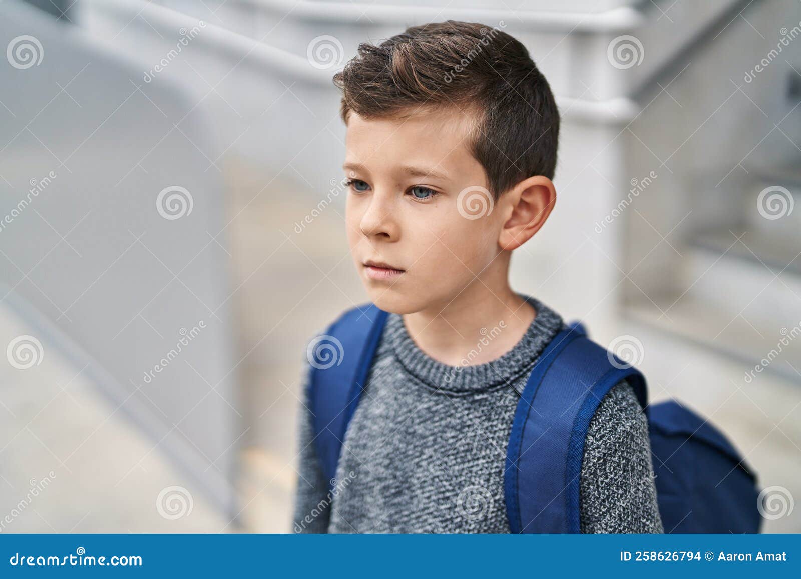 Blond Child Student Standing with Serious Expression at School Stock ...