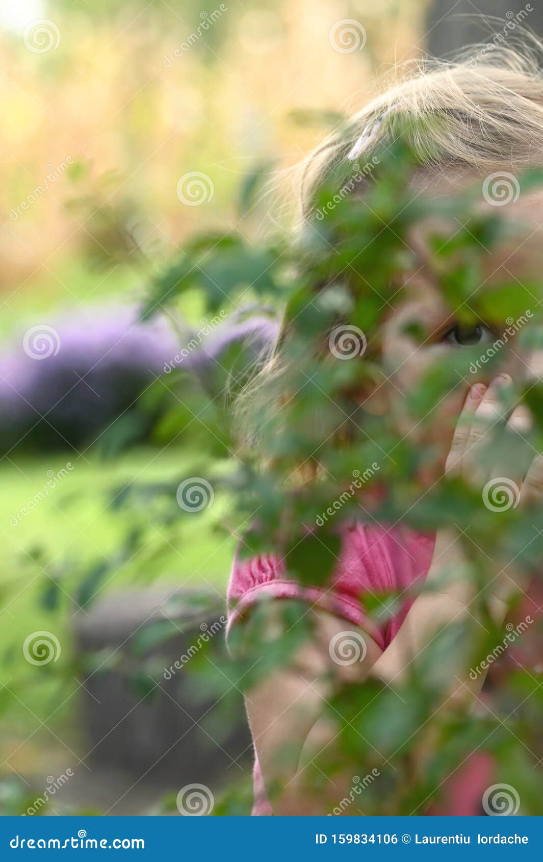 Blond Cute Girl Hiding stock photo. Image of hand, activity - 159834106