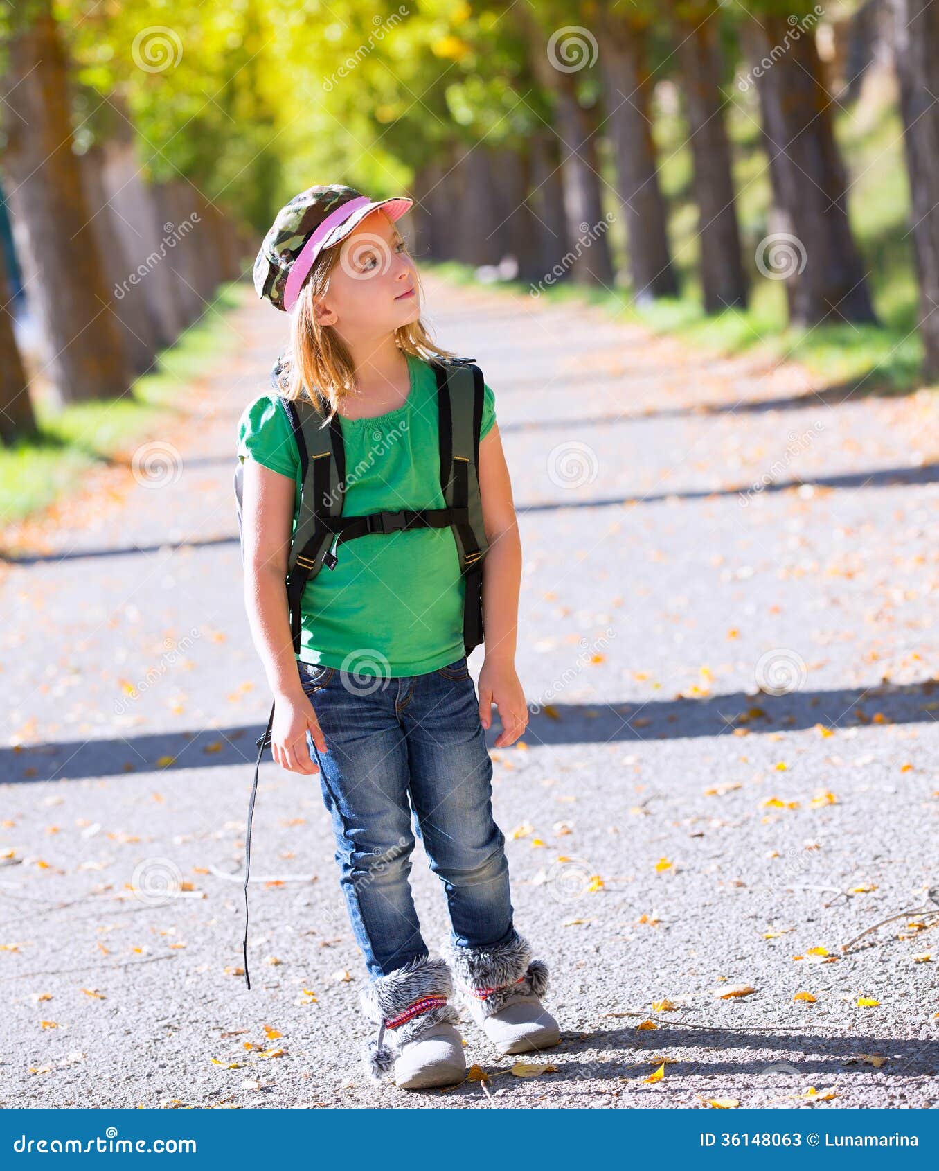 Blond Explorer Kid Girl Walking with Backpack in Autumn Trees Stock ...