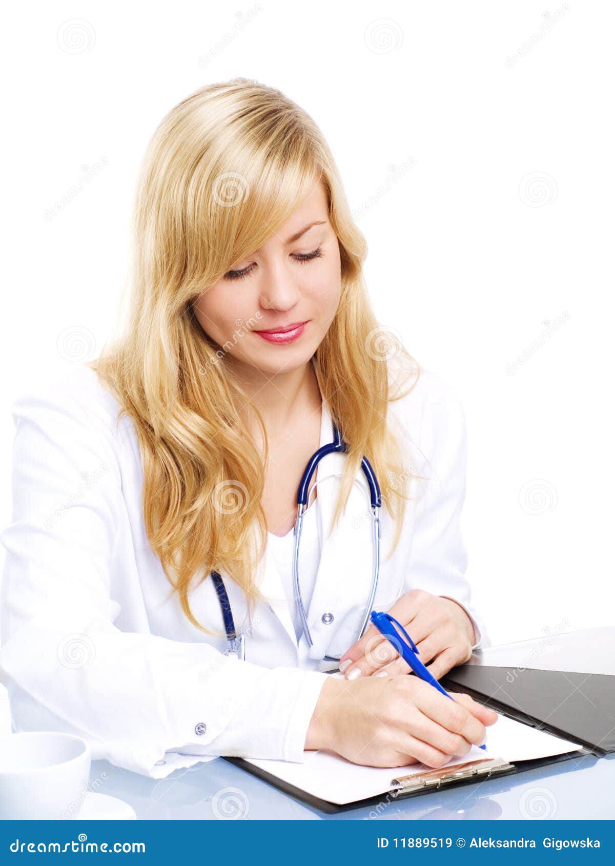 Blond Female Doctor Making Notes in Office Stock Image - Image of ...