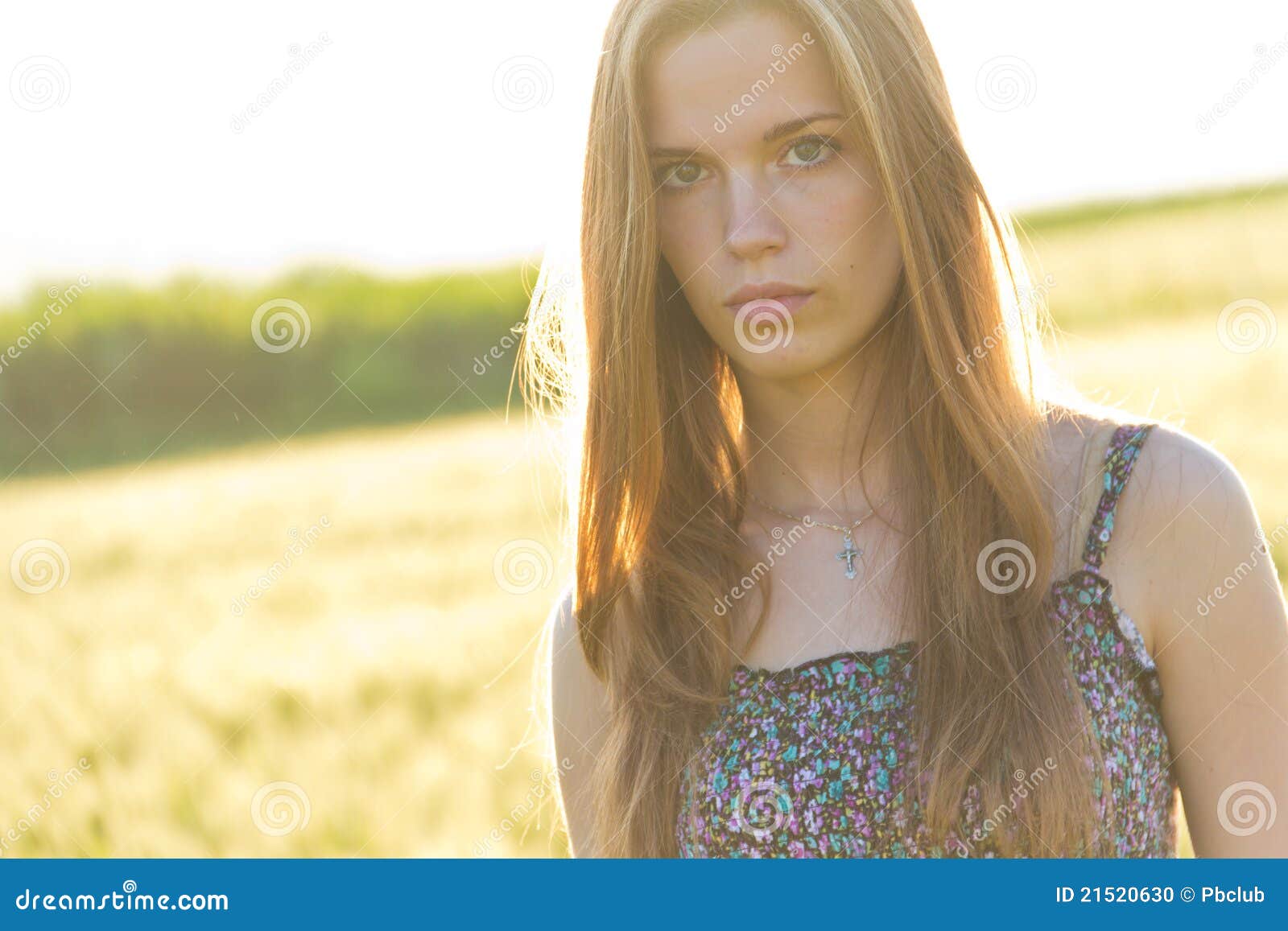 Blond girl in countryside stock photo. Image of field - 21520630