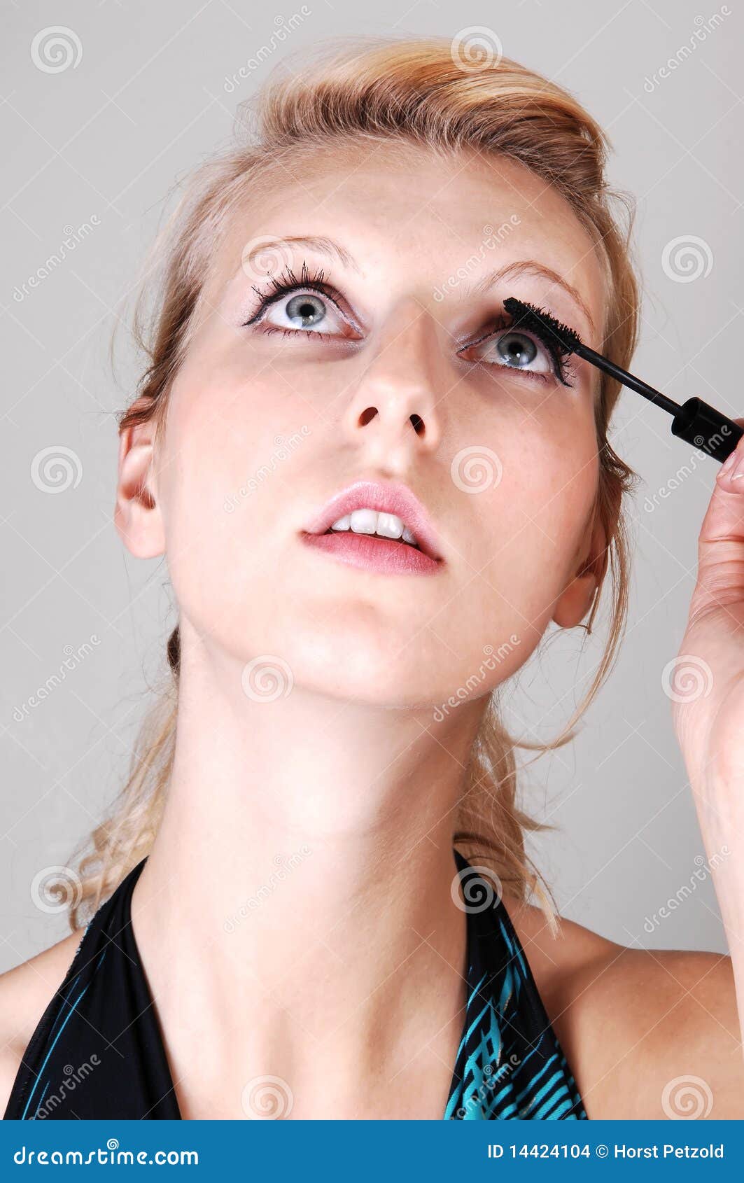 Blond Girl Fixing Her Eyelashes. Stock Photo - Image of attractive ...
