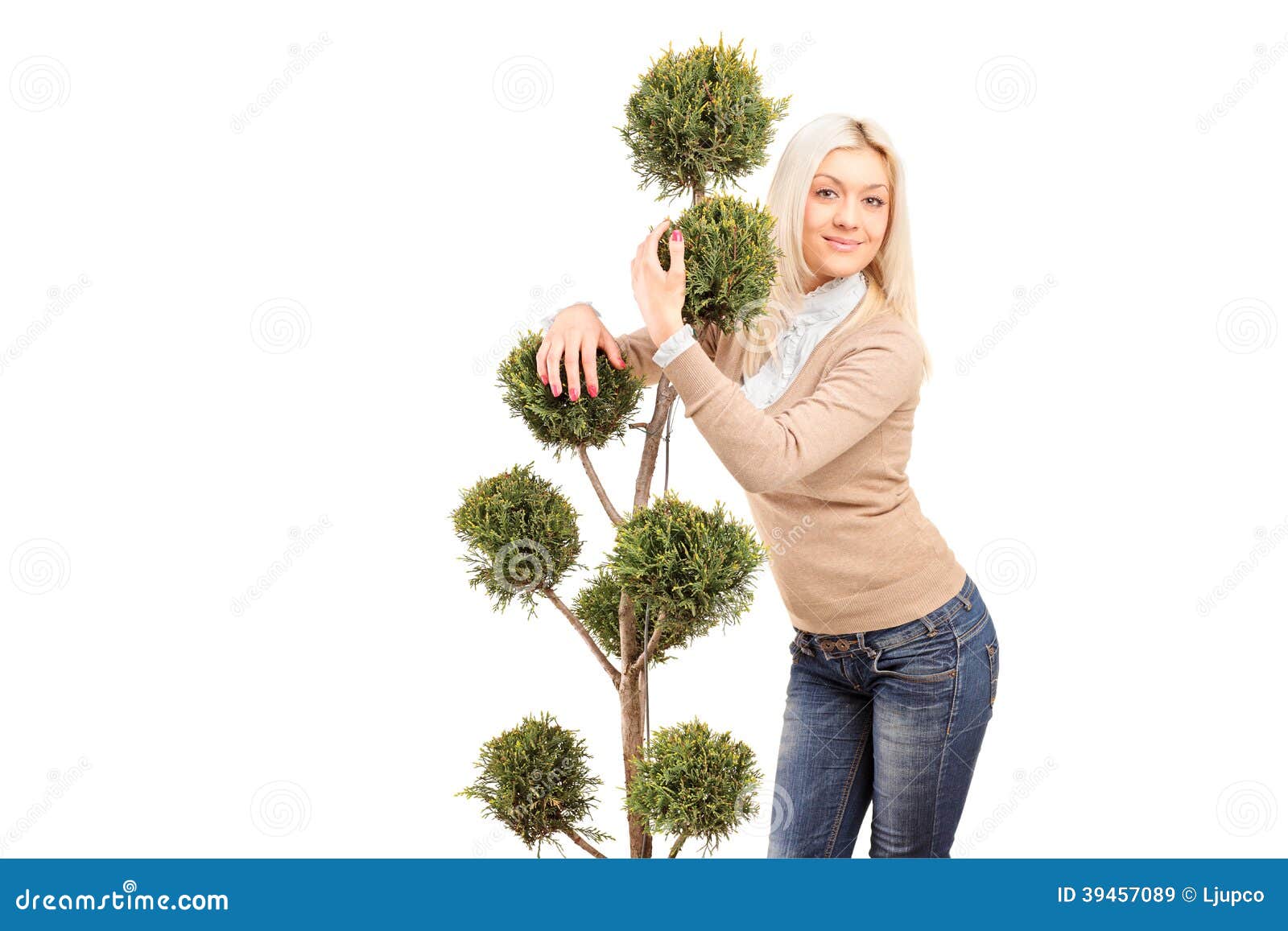 Blond girl hugging a plant stock image. Image of studio - 39457089