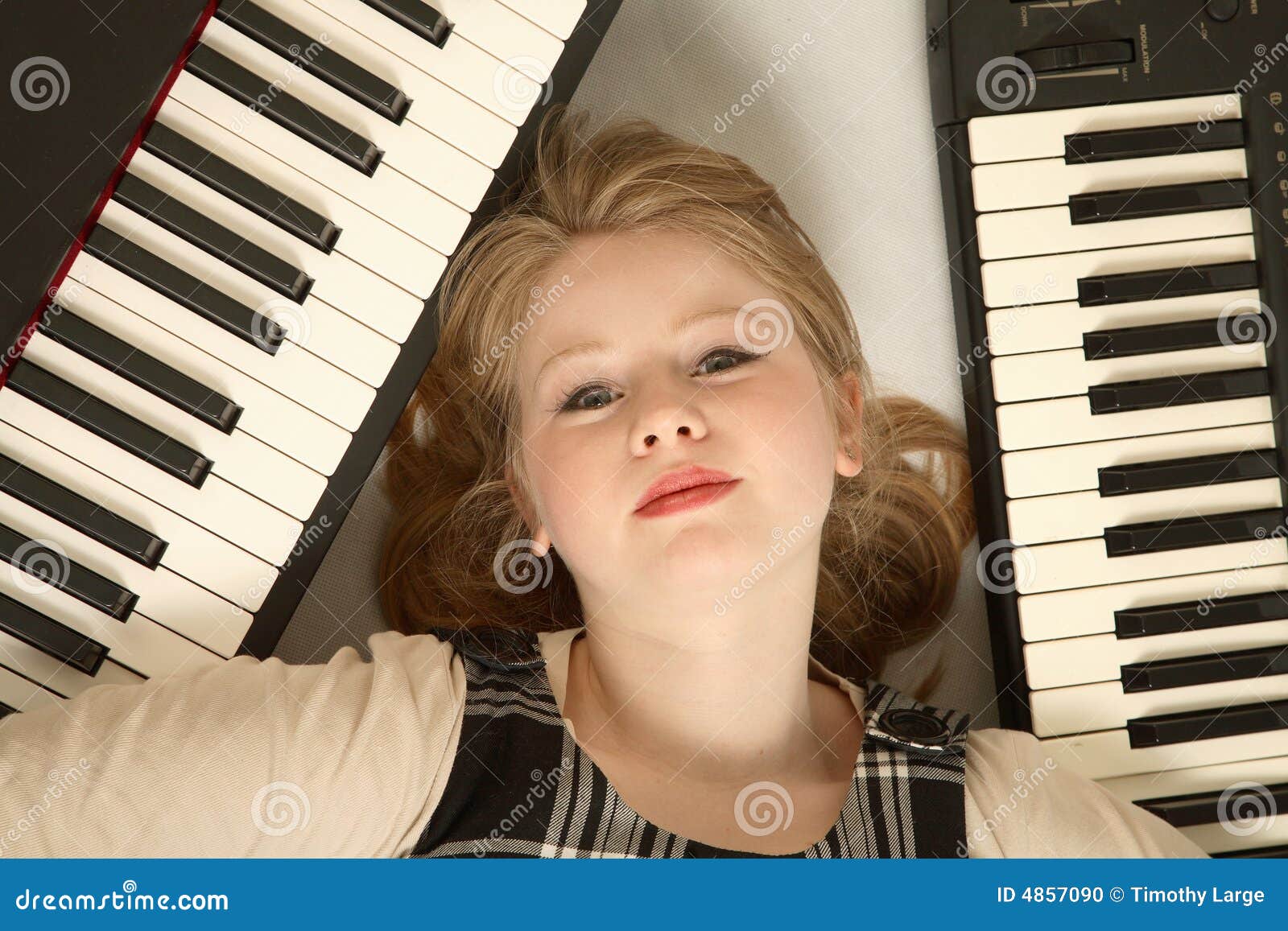 Blond girl and keyboards stock photo. Image of youth, young - 4857090