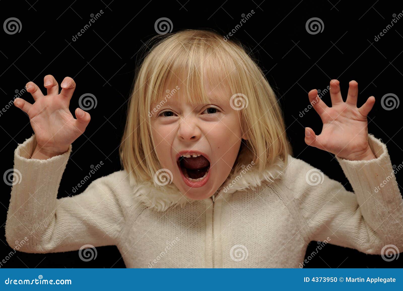 Blond Girl Making Scary Face Stock Photo - Image of expressive, scream ...