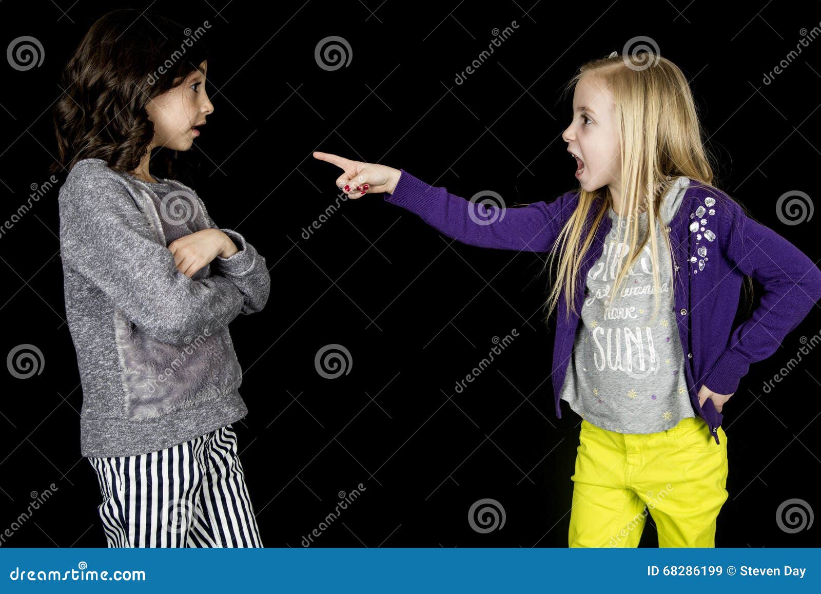 Blond Girl Pointing Accusing Finger at Cute Friend Great Express Stock ...