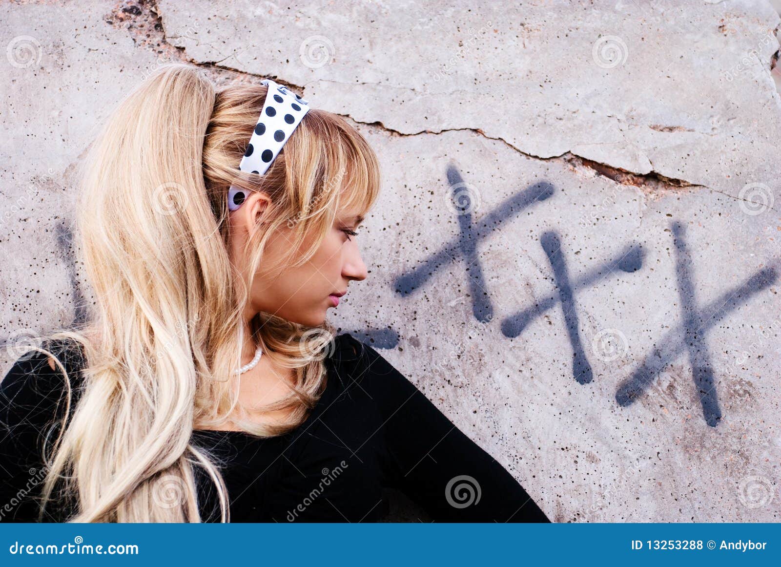 Blond Girl Posing Near the Writing on the Wall Stock Photo - Image of ...